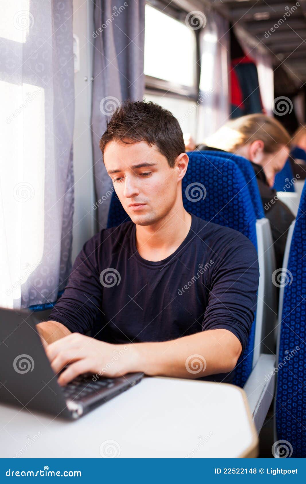 Man Using His Laptop Computer while on the Train Stock Photo - Image of ...