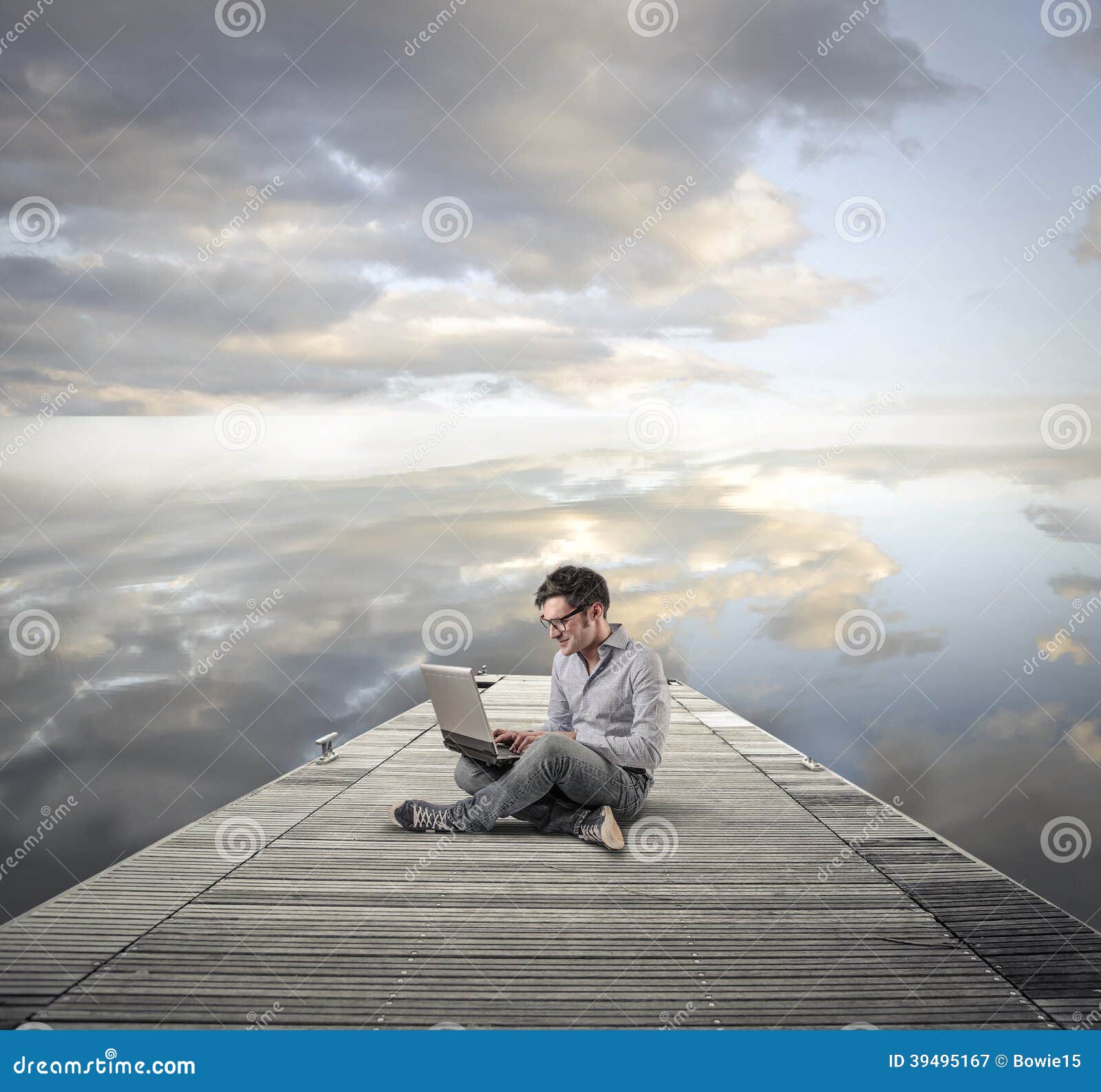 Man using his laptop stock image. Image of laptop, notebook - 39495167