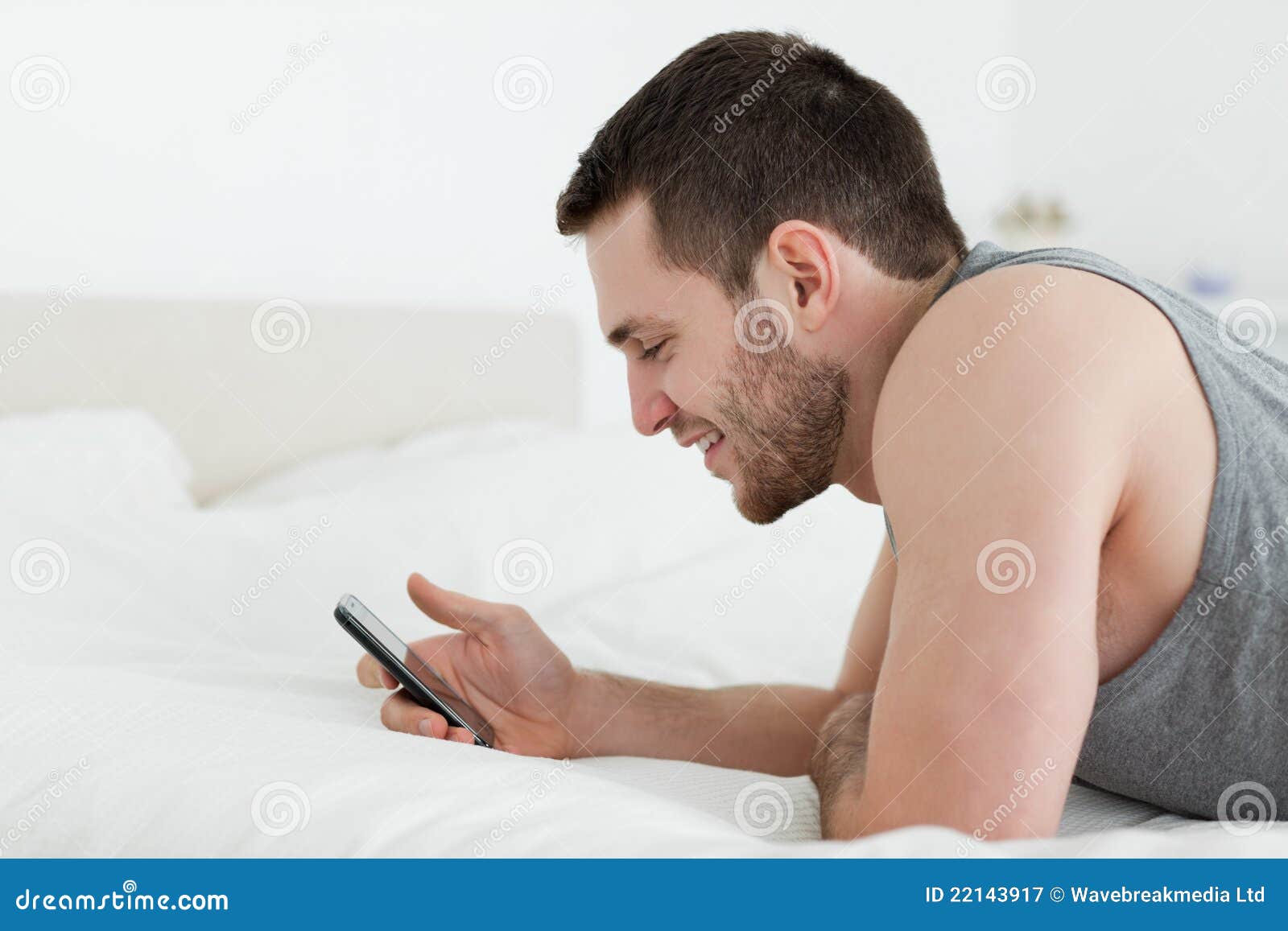 Man using his mobile phone stock image. Image of model - 22143917