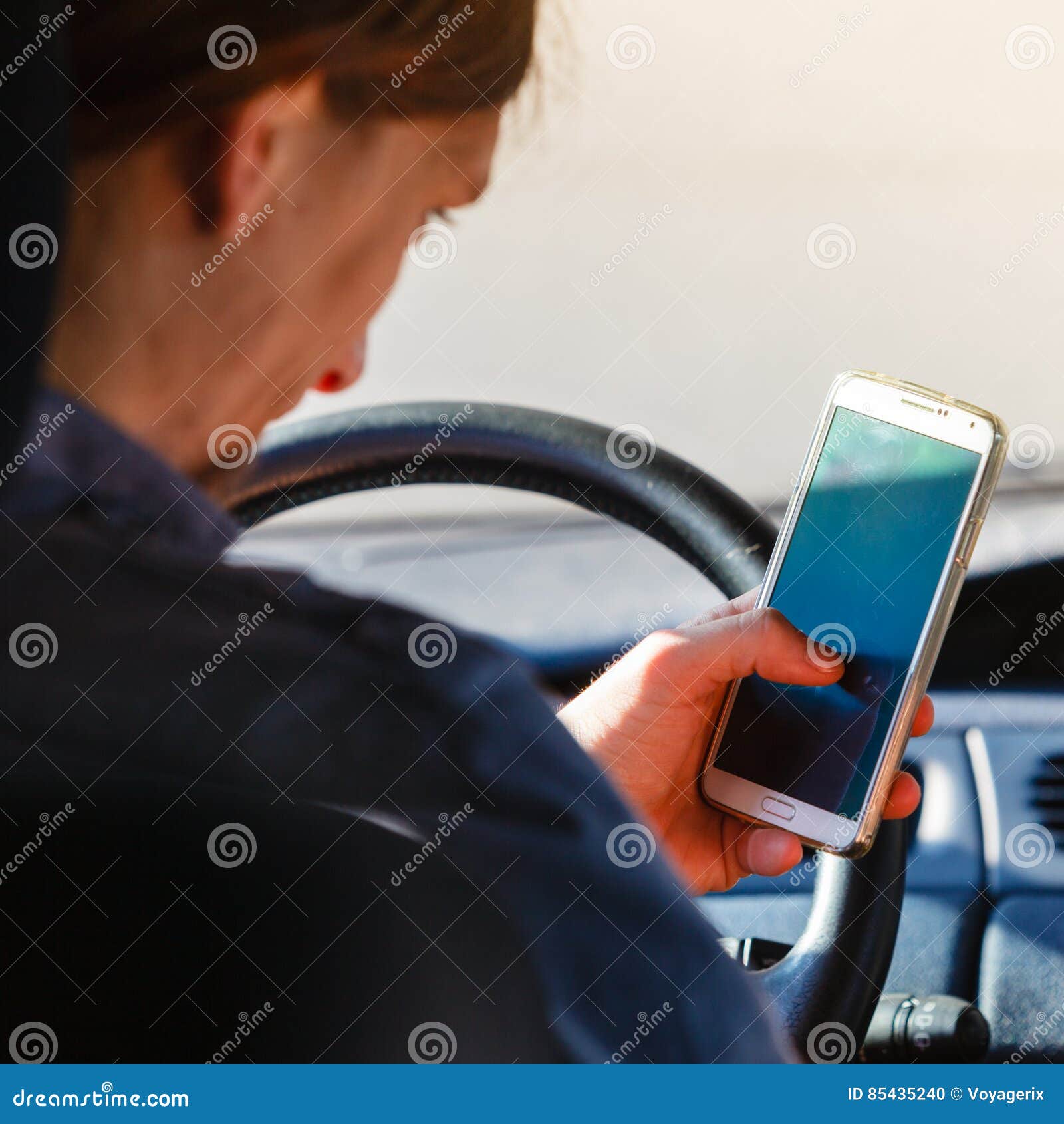 Man Using His Phone while Driving Car. Stock Photo - Image of drive ...