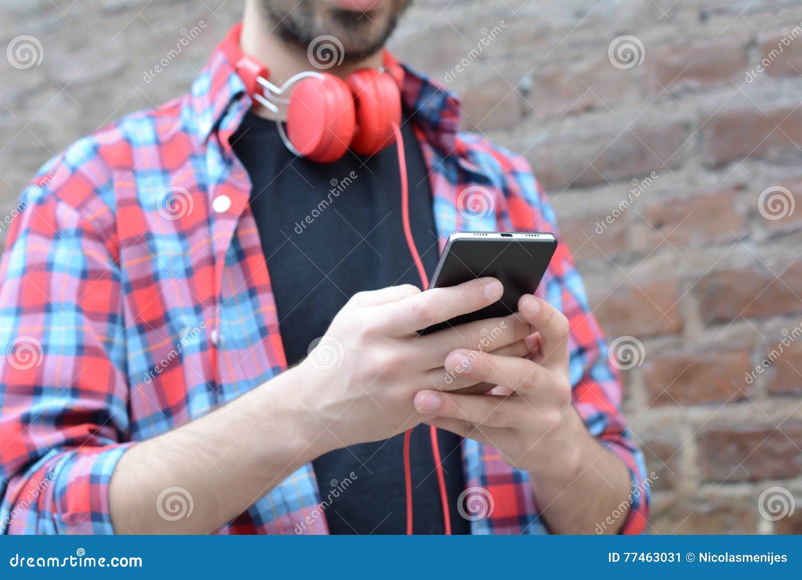 Man using his smartphone stock image. Image of smartphone - 77463031 Man using his smartphone stock image. Image of smartphone - 77463031