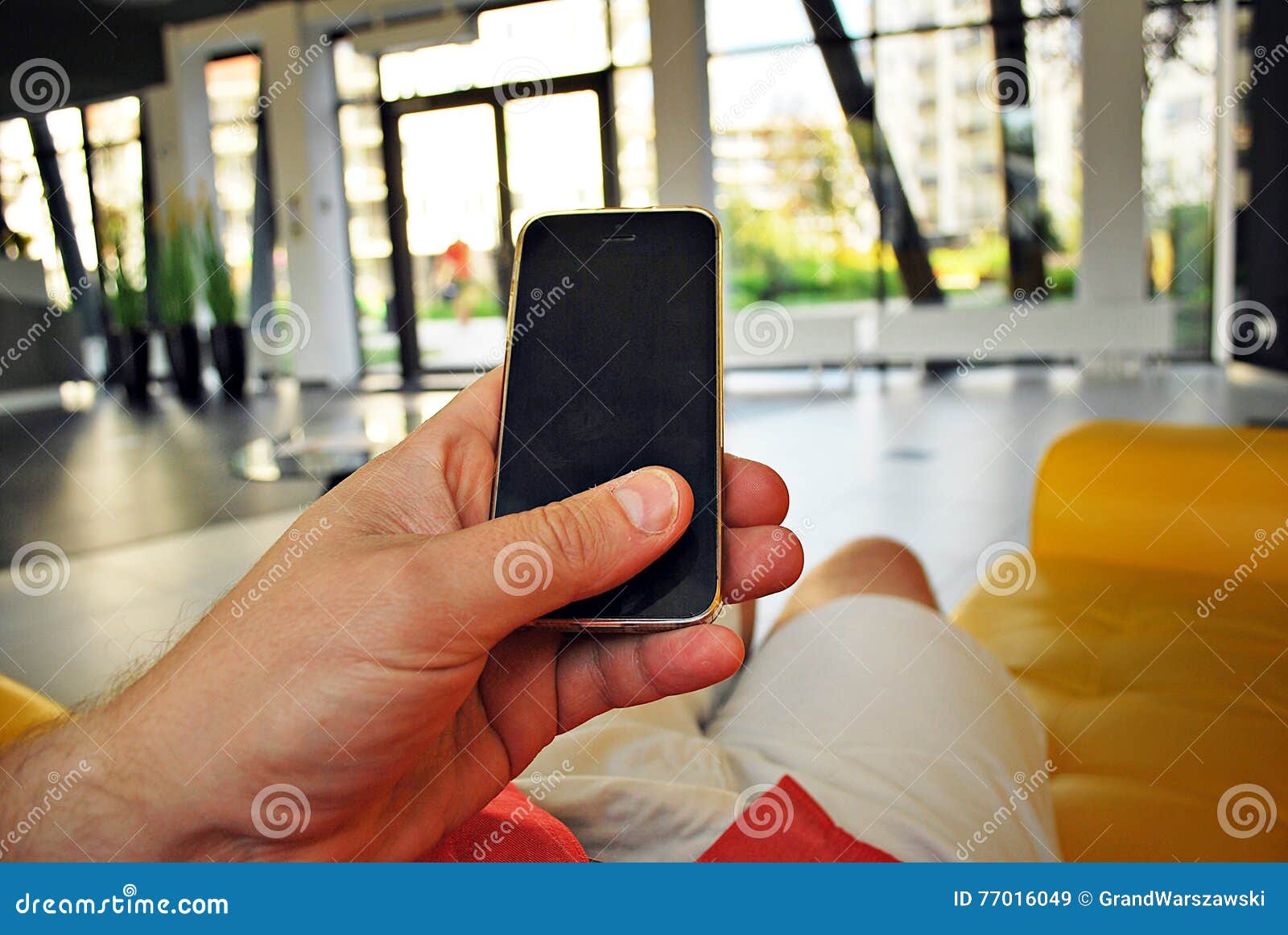 Man using his smartphone stock image. Image of modern - 77016049