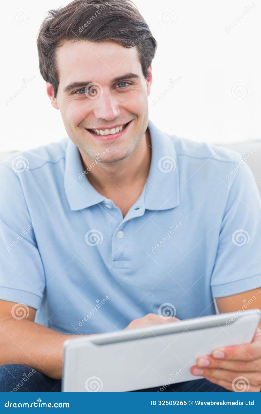 Man using his tablet stock photo. Image of indoors, male - 32509266