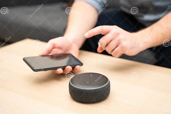 Man Using Home Assistant Bluetooth Speaker Stock Image - Image of ...