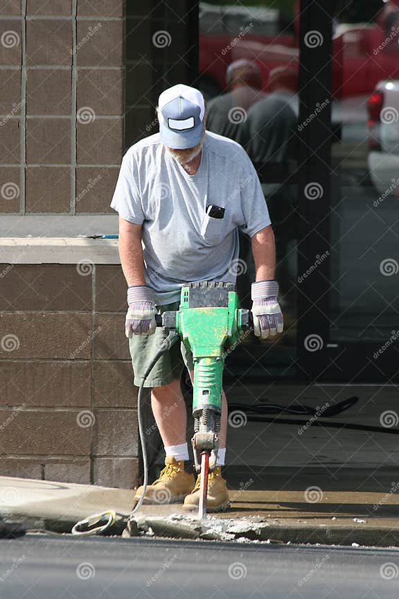 Man using jack hammer stock image. Image of elderly, construction - 2674897