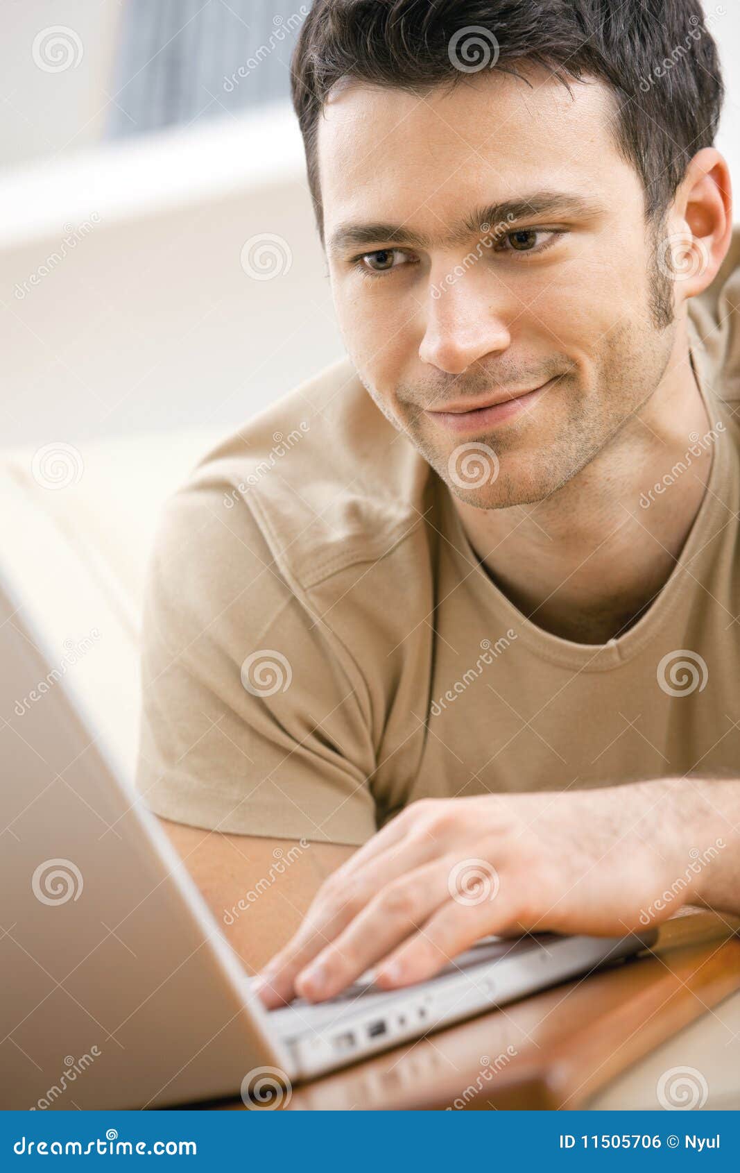 Man Using Laptop Computer at Home Stock Photo - Image of good, browsing ...