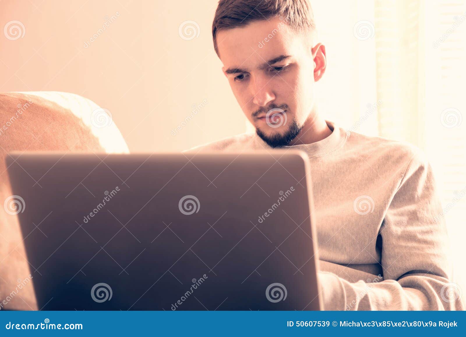 Man using laptop computer stock image. Image of looking - 50607539