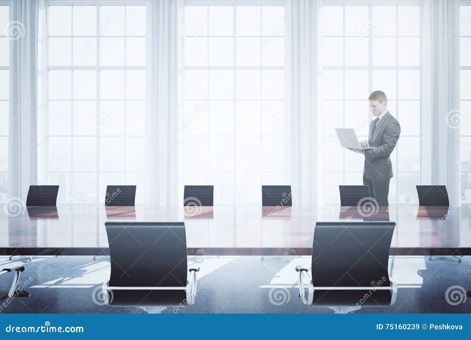 Man Using Laptop in Conference Room Stock Image - Image of boradroom ...