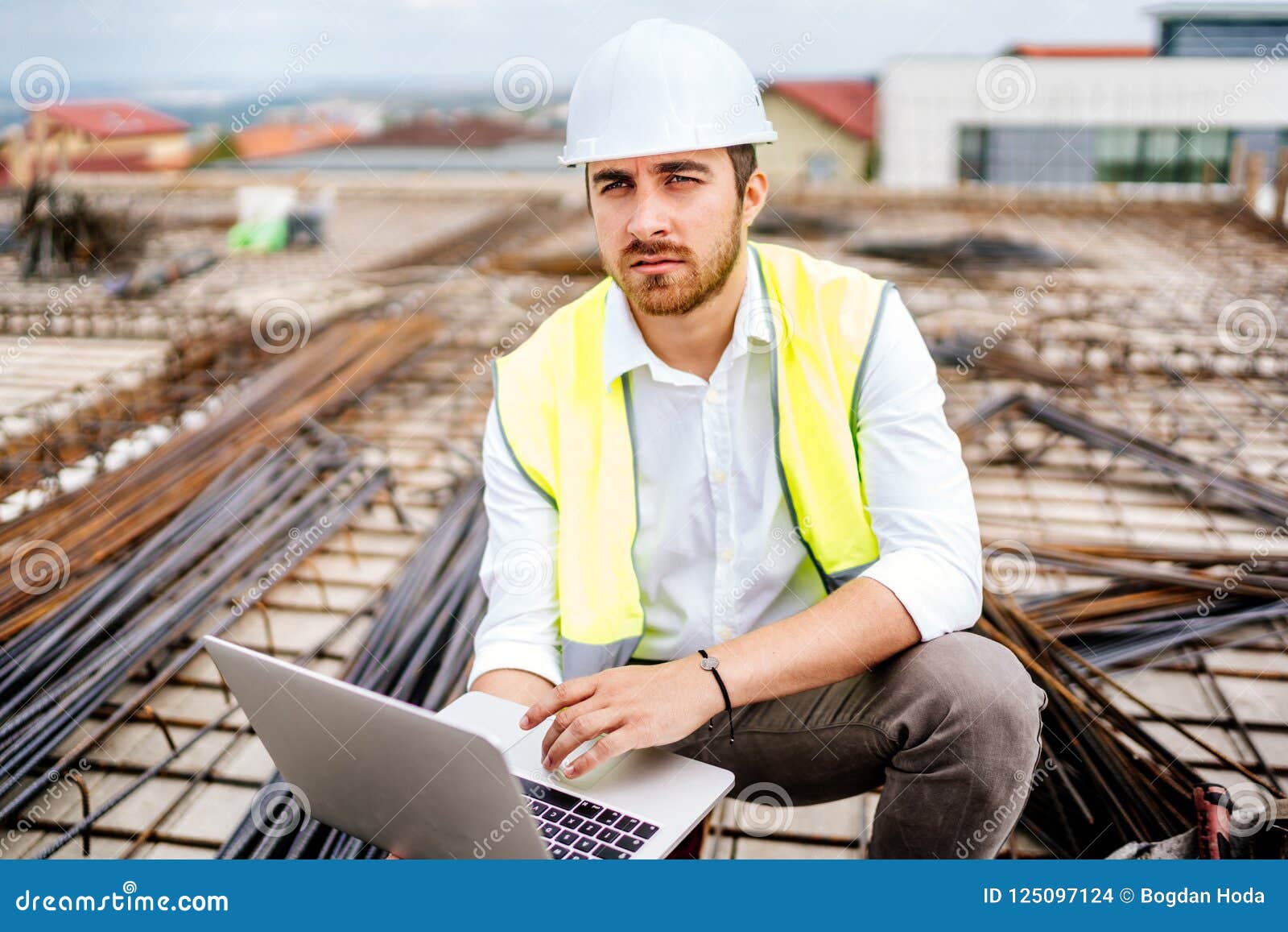 Man Using Laptop on Construction Site. Industry Details Stock Photo ...