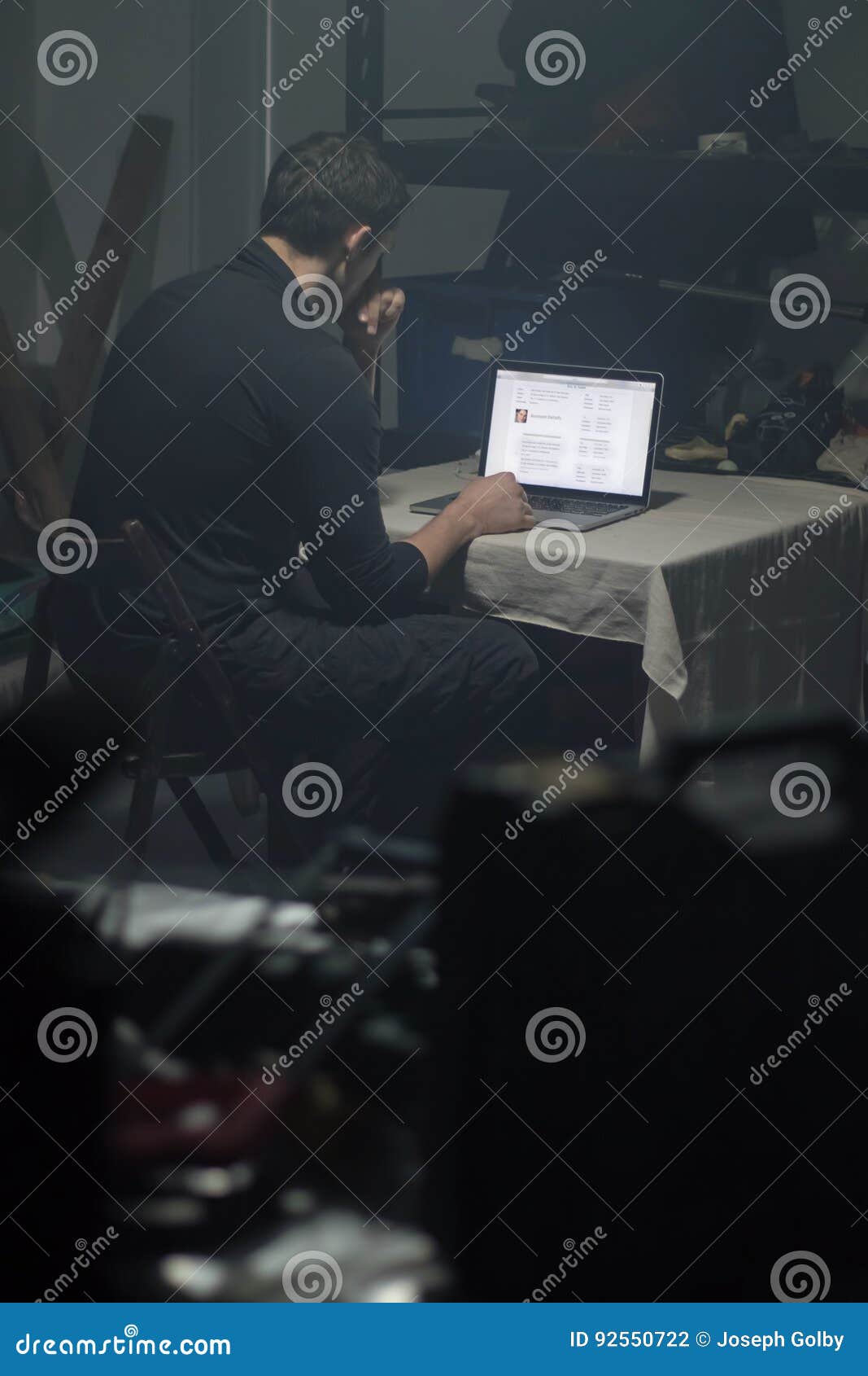 Man Using Laptop in Dark Room. Stock Photo - Image of dark, online ...