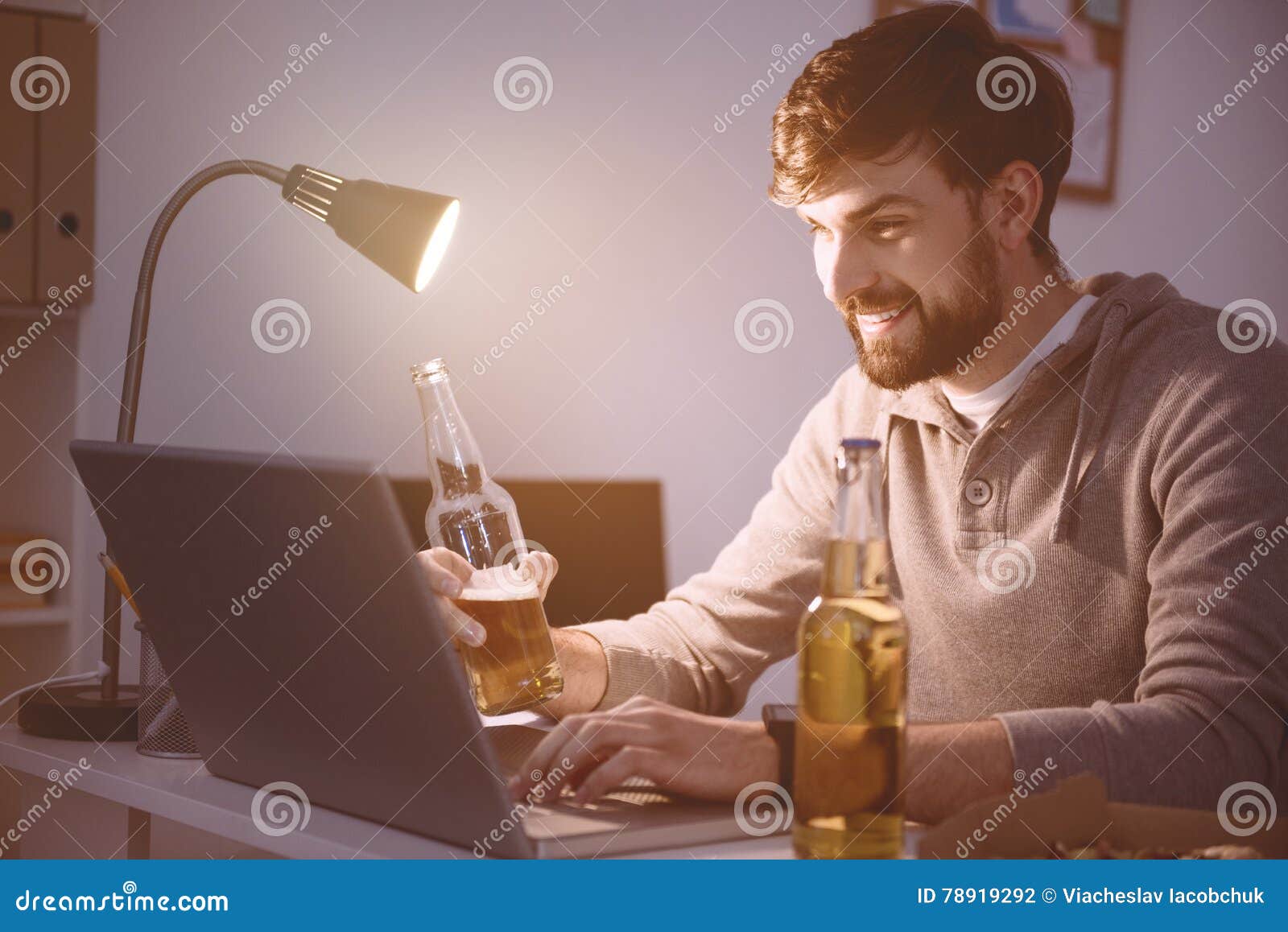 Man Using Laptop and Having a Beverage Stock Photo - Image of home ...