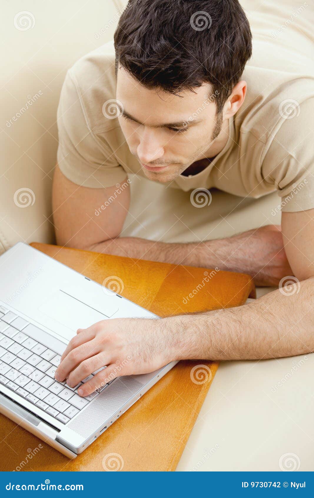 Man using laptop at home stock photo. Image of adult, employment - 9730742