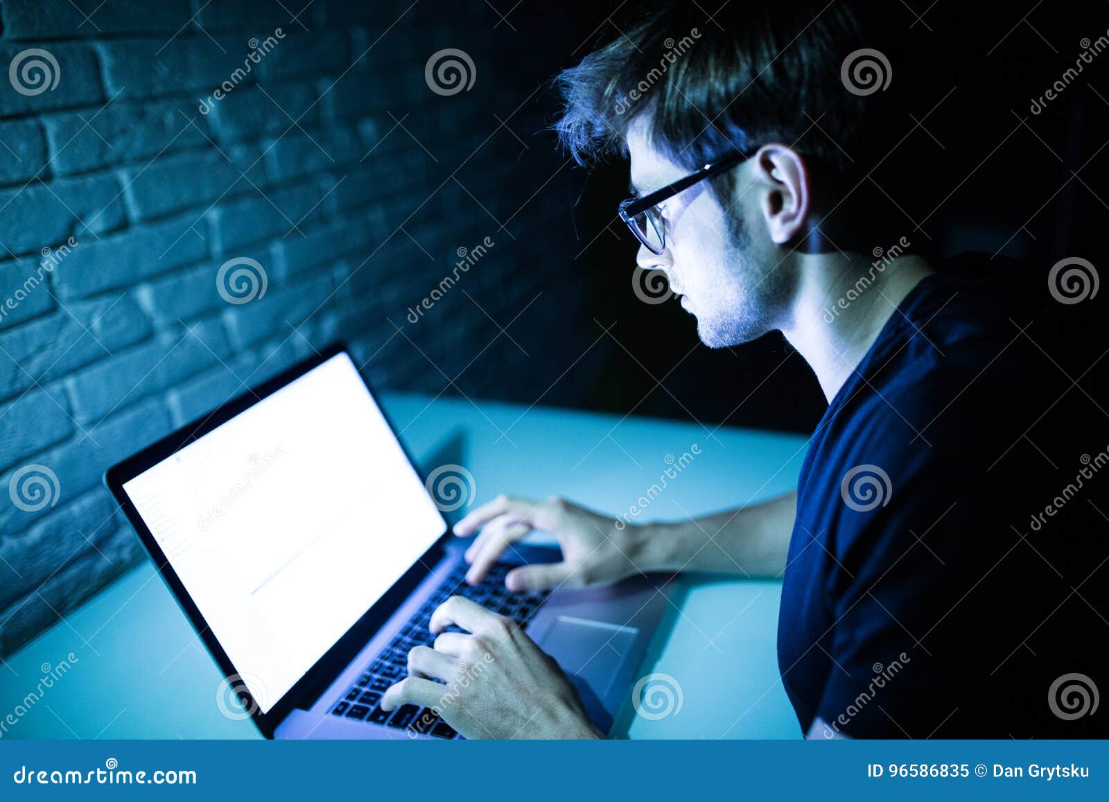 Man Using Laptop in the Night with White Screen Copy Space Stock Image ...