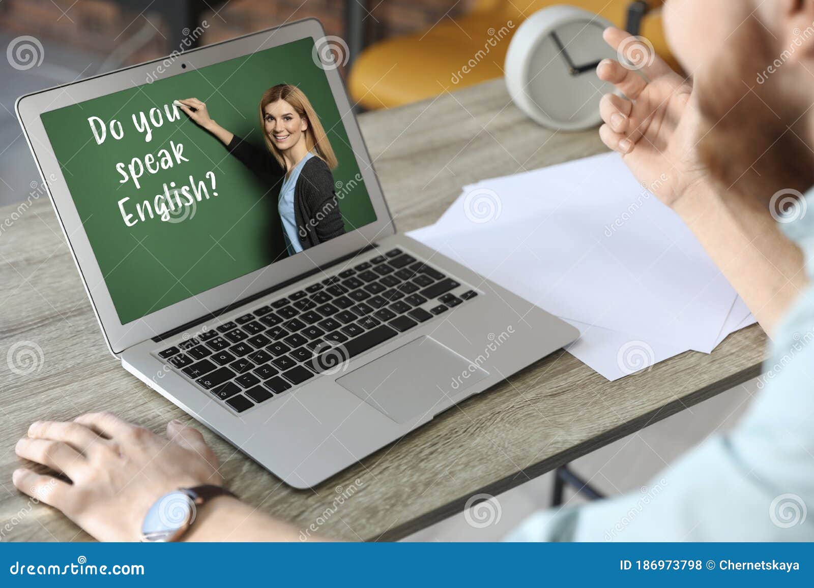 Man Using Laptop for Online English Learning with Teacher at Home Stock ...