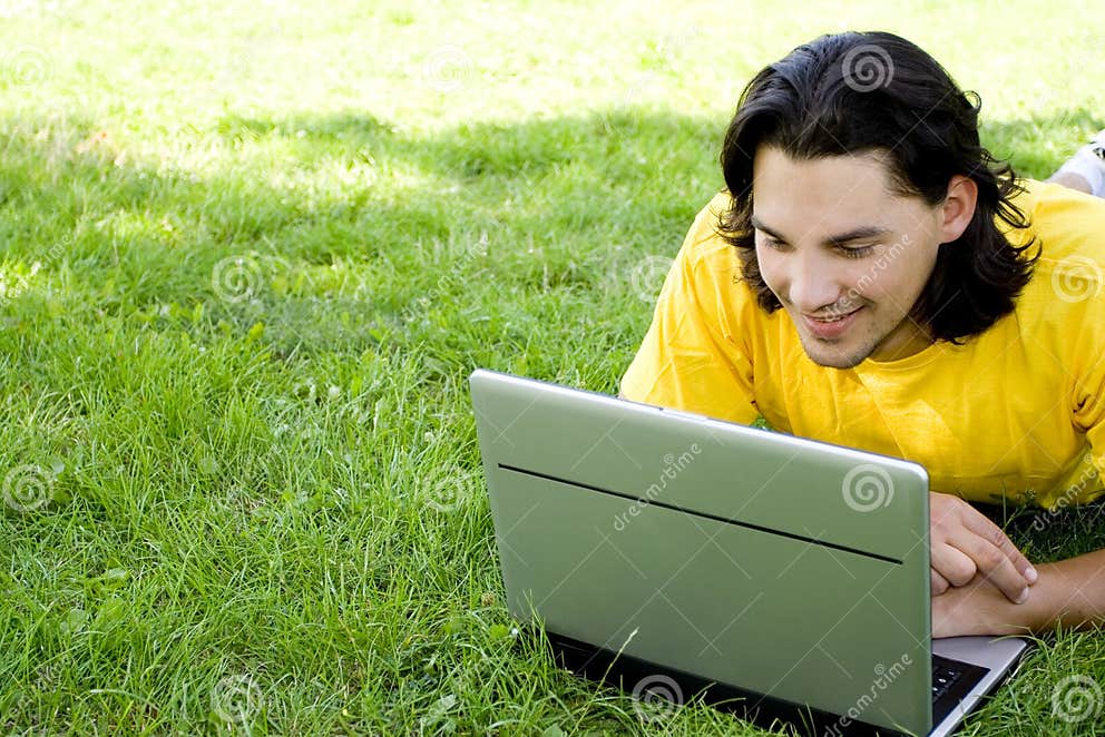 Man using laptop outdoors stock photo. Image of summer - 5989598