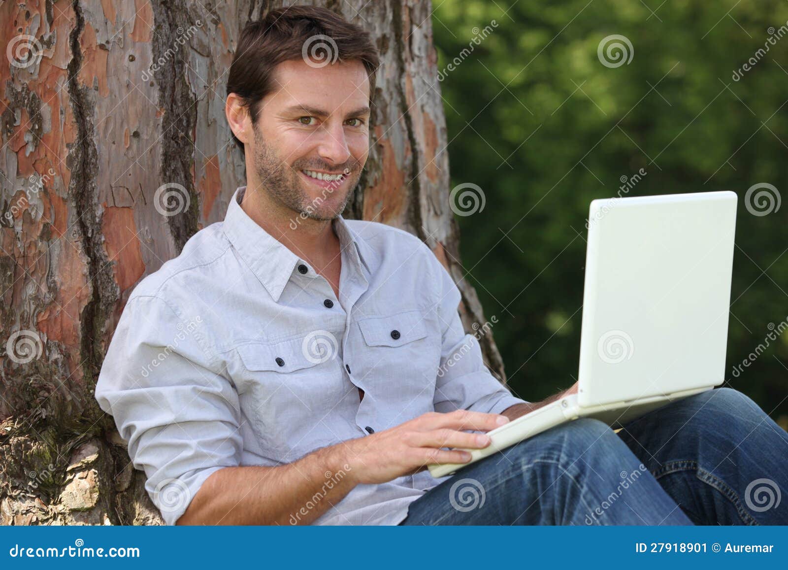 Man using laptop outside stock image. Image of holiday - 27918901