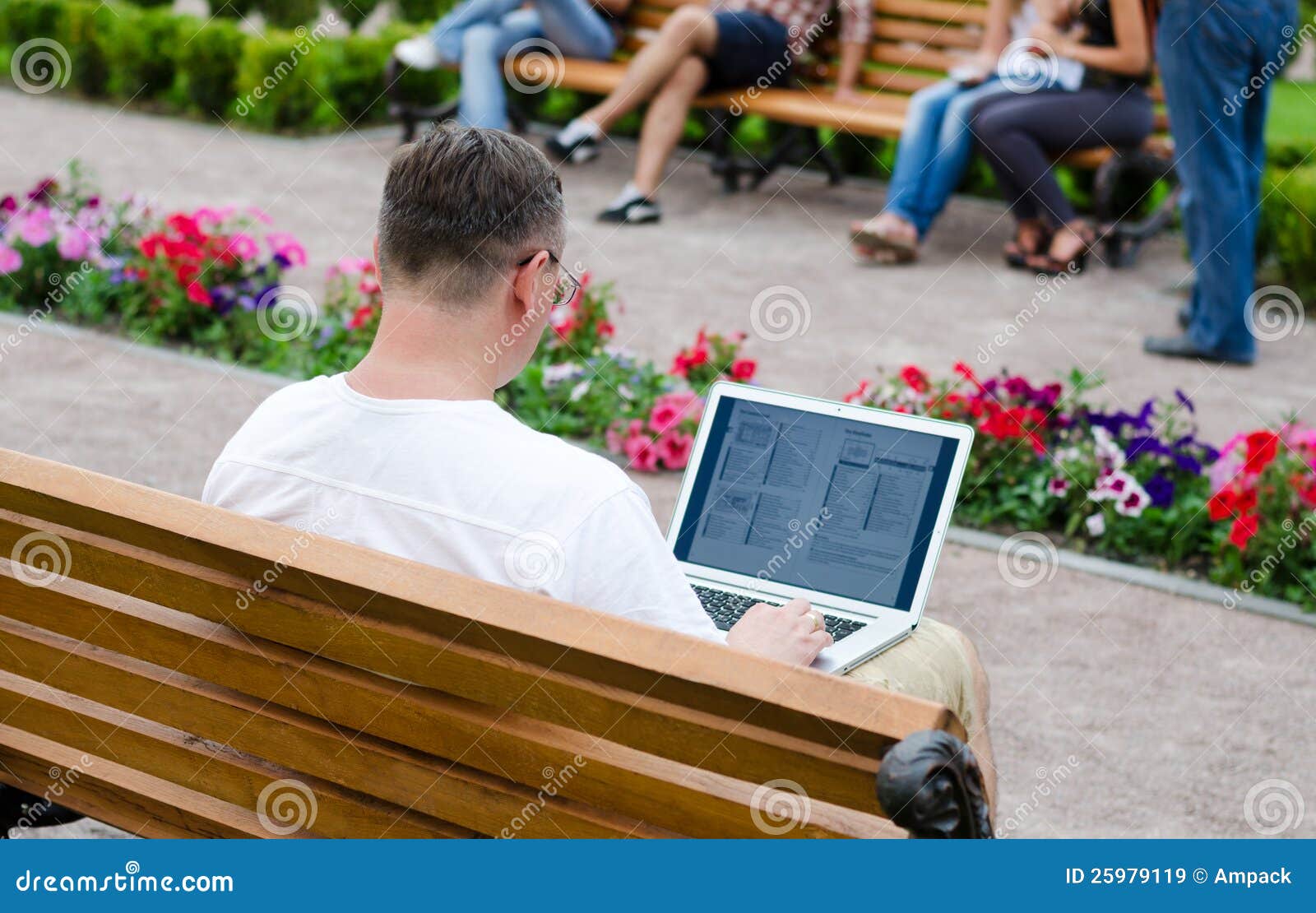 Man Using a Laptop in a Public Park Stock Image - Image of slats ...
