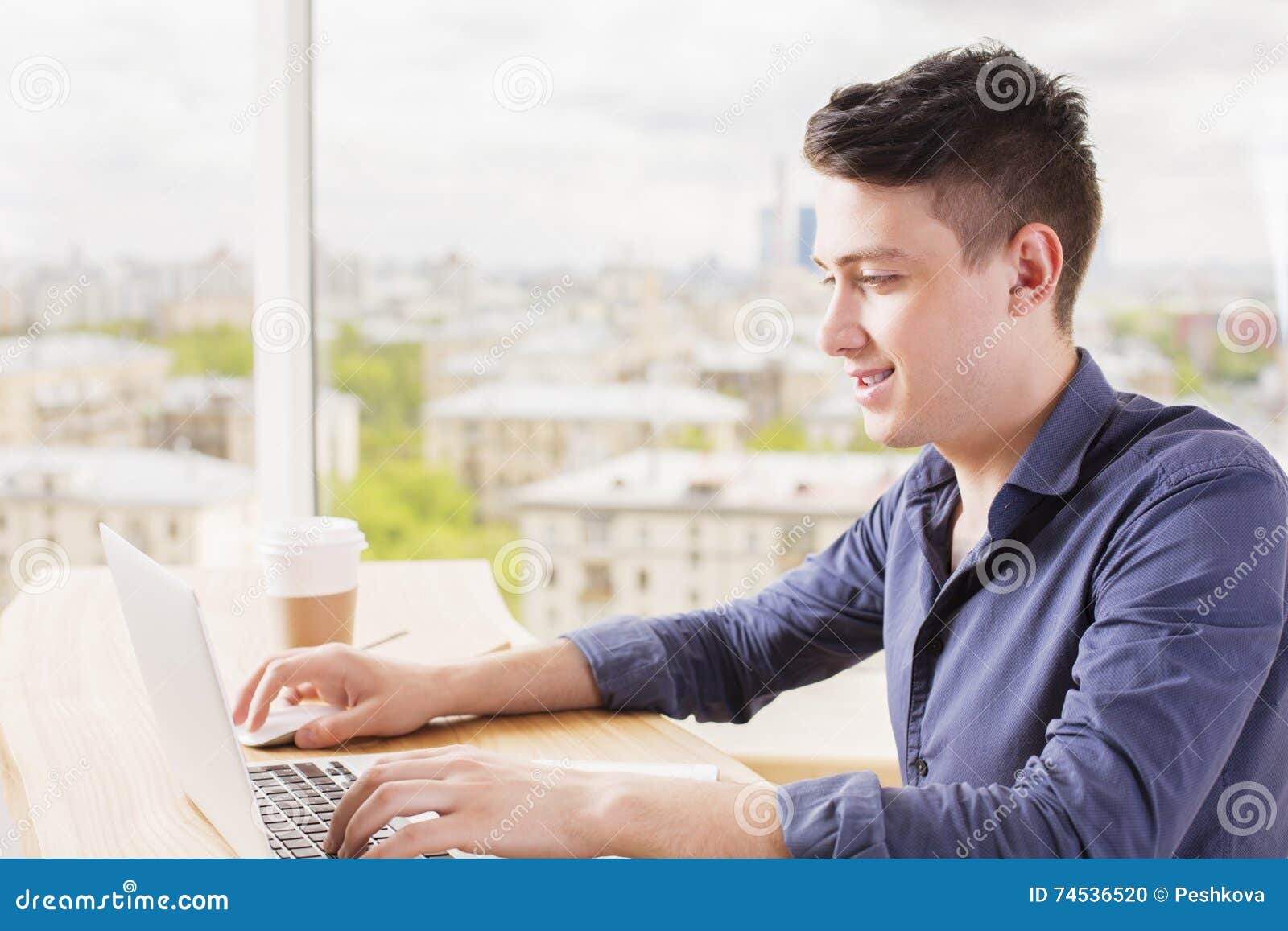 Man using laptop side stock photo. Image of portrait - 74536520