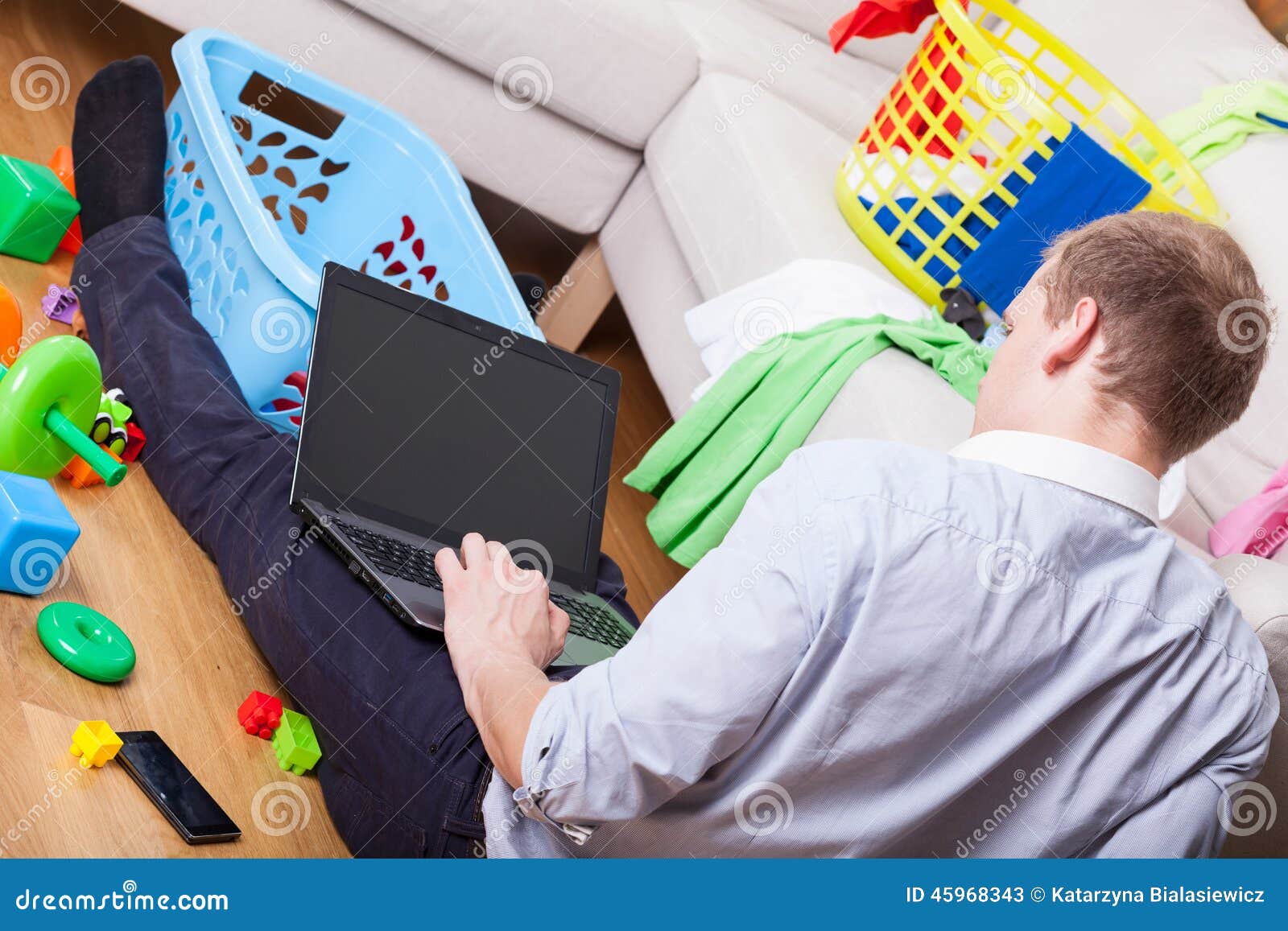 Man Using Laptop Sitting on the Floor Stock Image - Image of blond ...