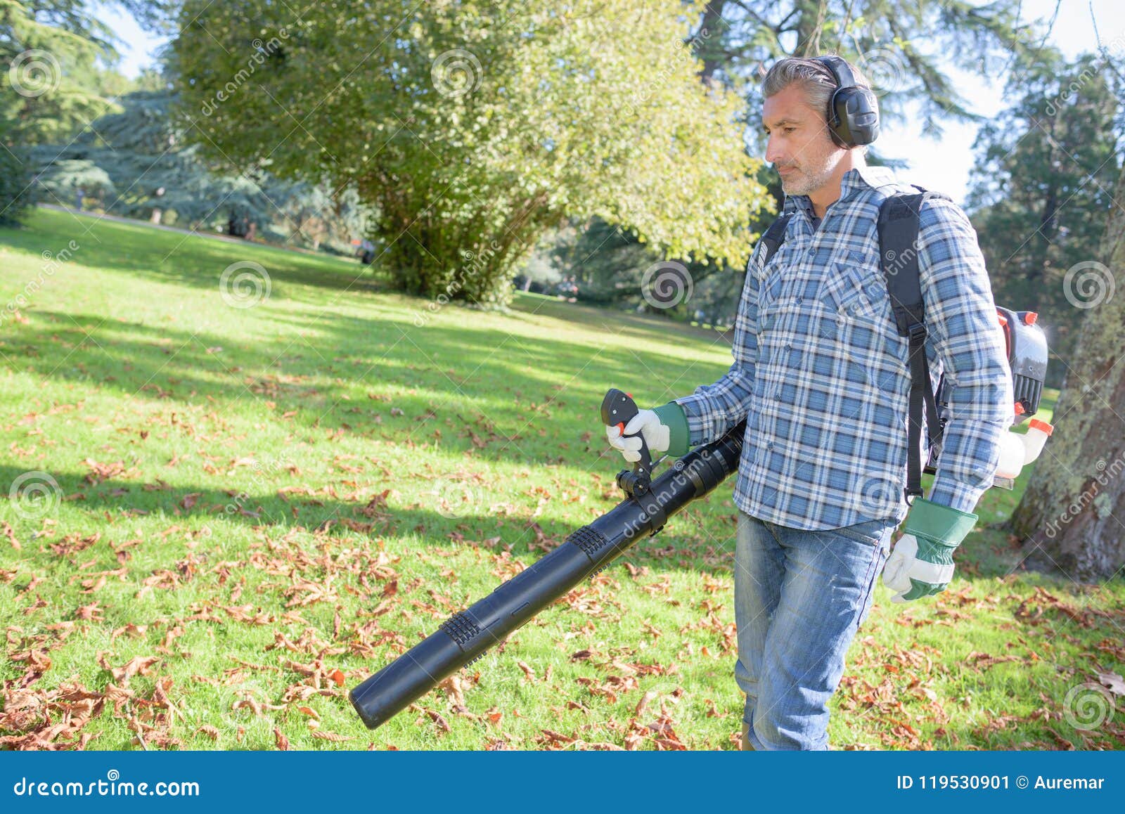 Man using leaf blower stock image. Image of engine, mature - 119530901