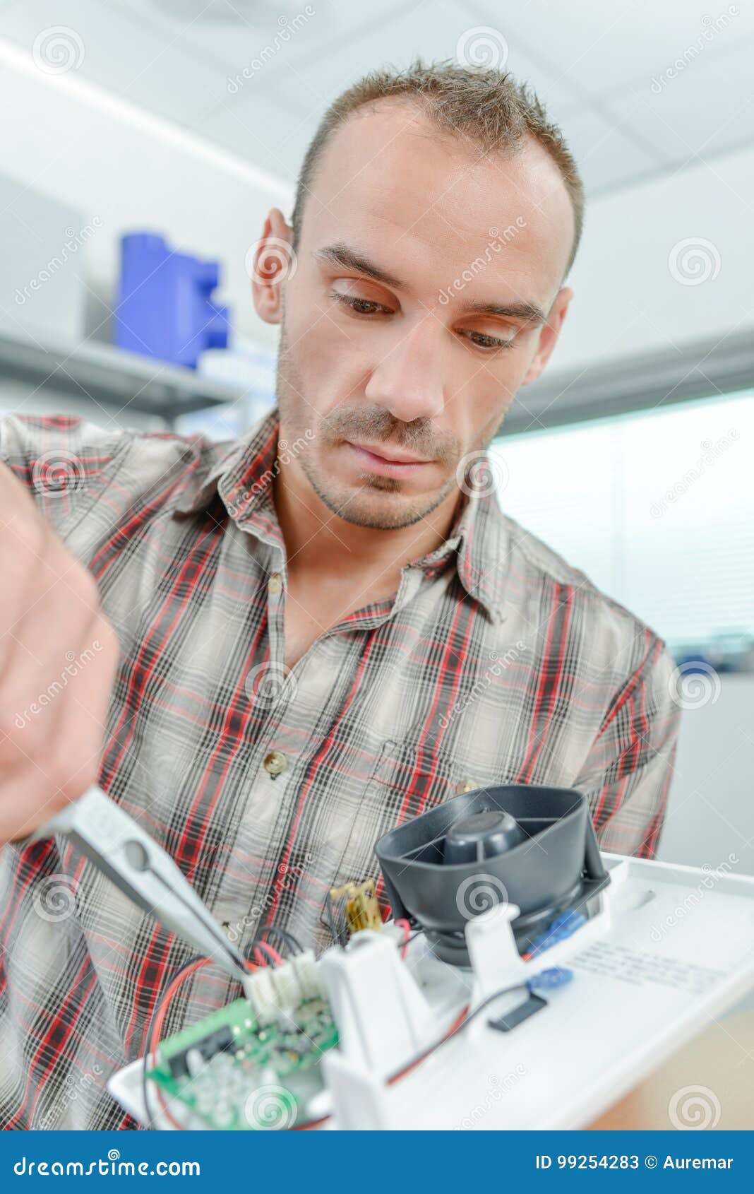 Man Using Long Nose Pliers on Back Electrical Appliance Stock Image ...