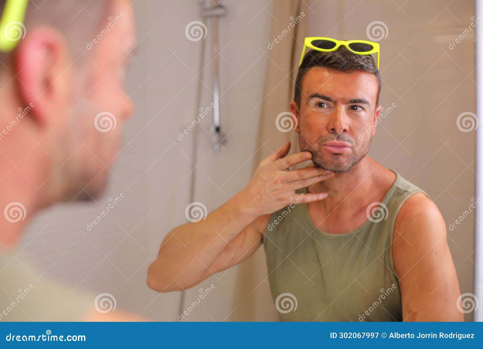 Man Using a Lot of Self Tanning Lotion Stock Image - Image of cover ...