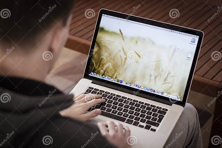 Man Using Macbook Pro Retina Editorial Stock Photo - Image of screen ...