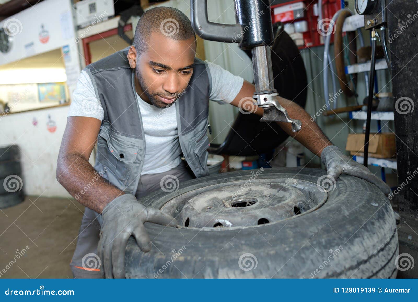 Man Using Machine To Change Tire Stock Image - Image of repair ...