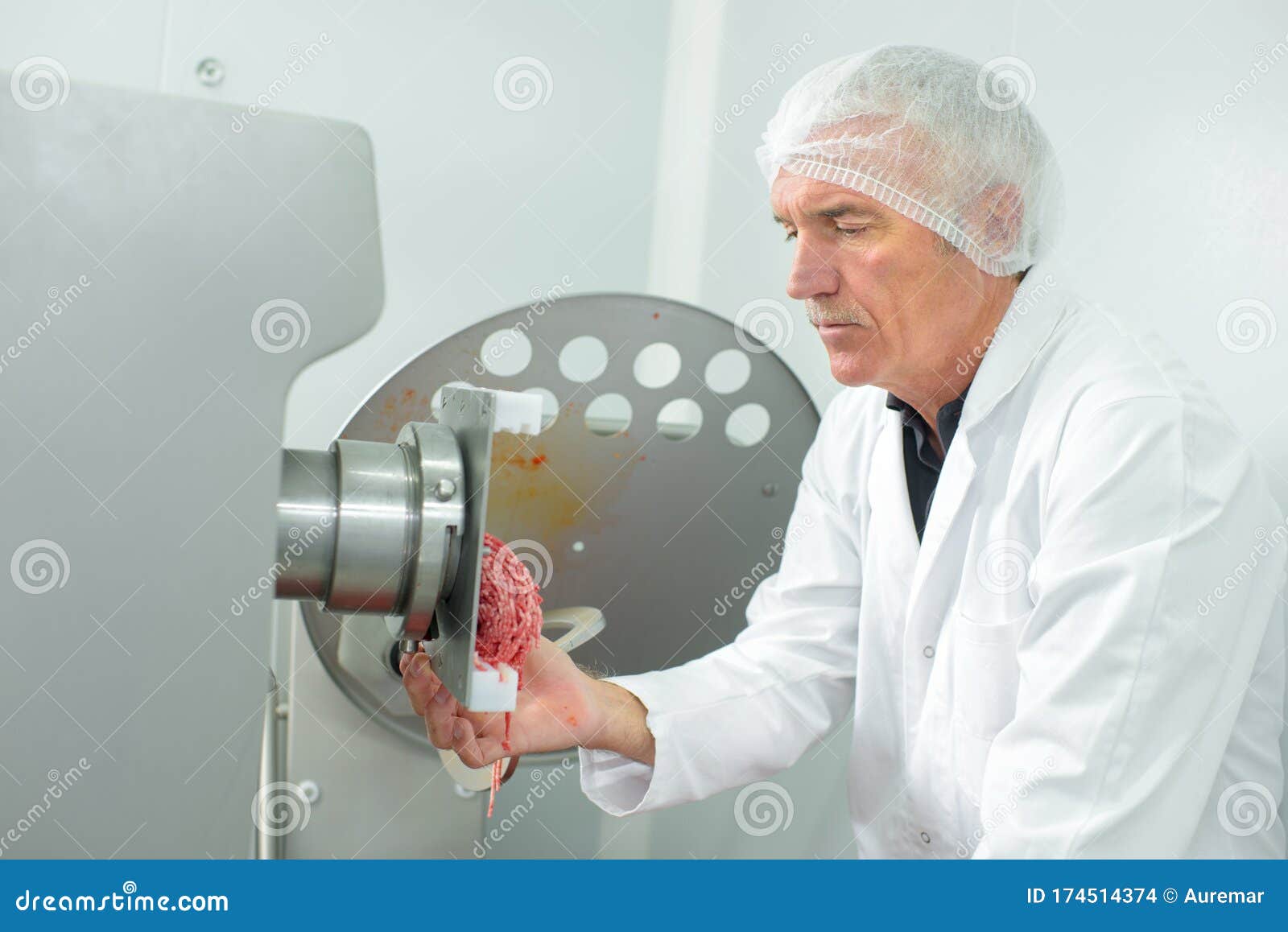 Man using mincing machine stock photo. Image of modern - 174514374