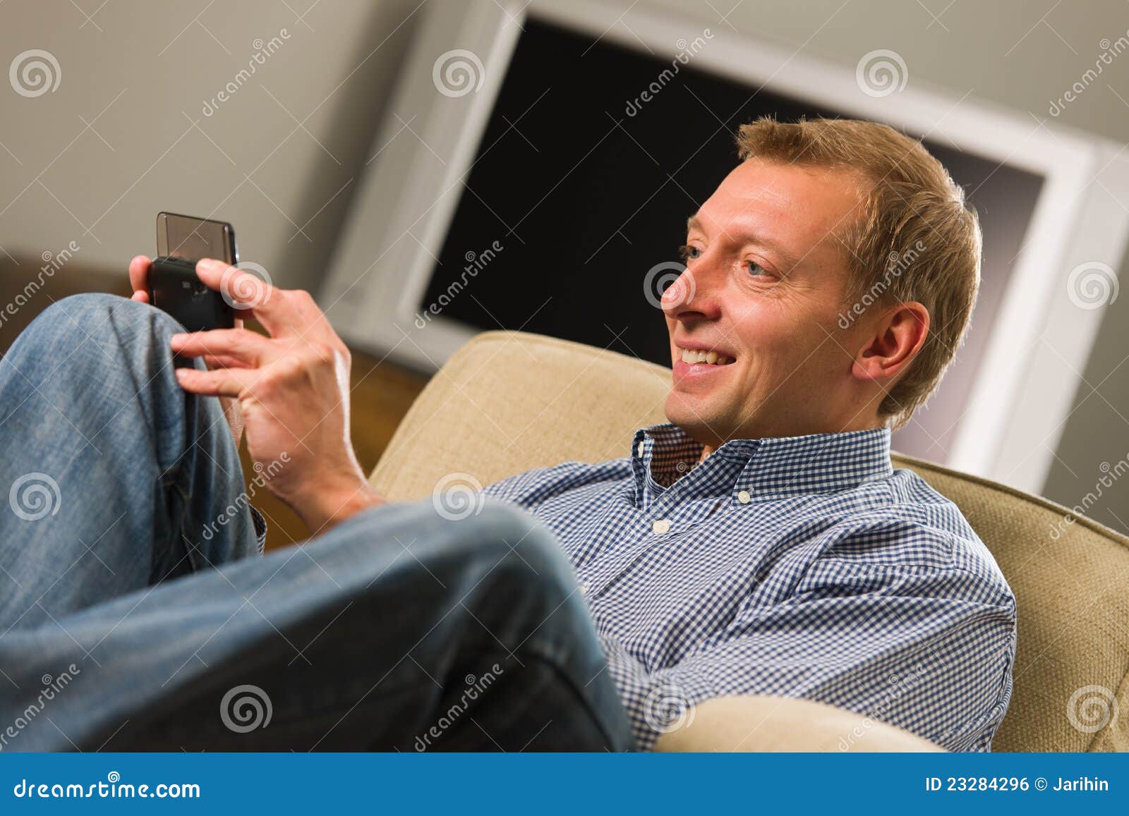 Man using mobile stock photo. Image of reading, shirt - 23284296