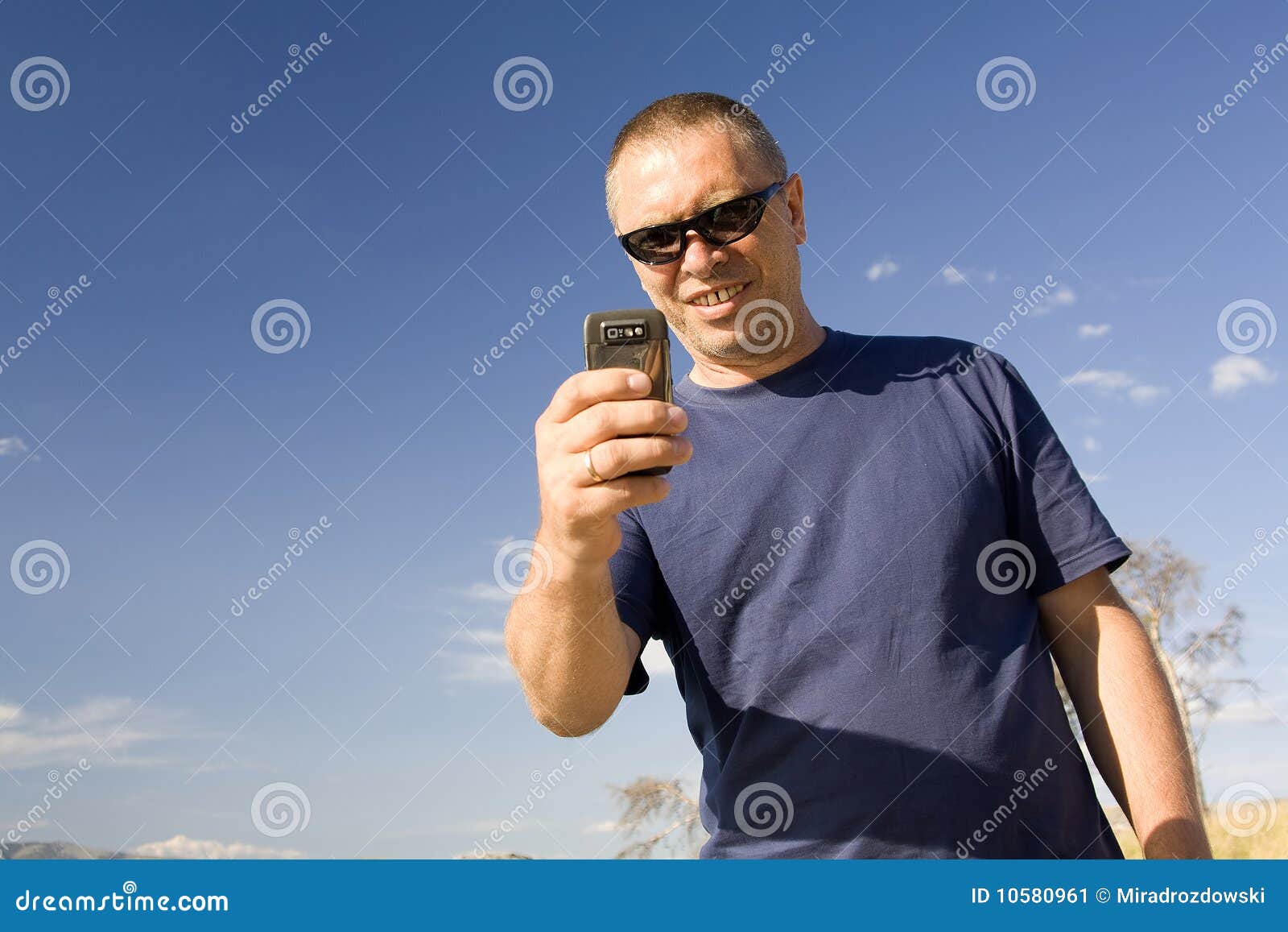 The man using mobile phone stock image. Image of isolated - 10580961