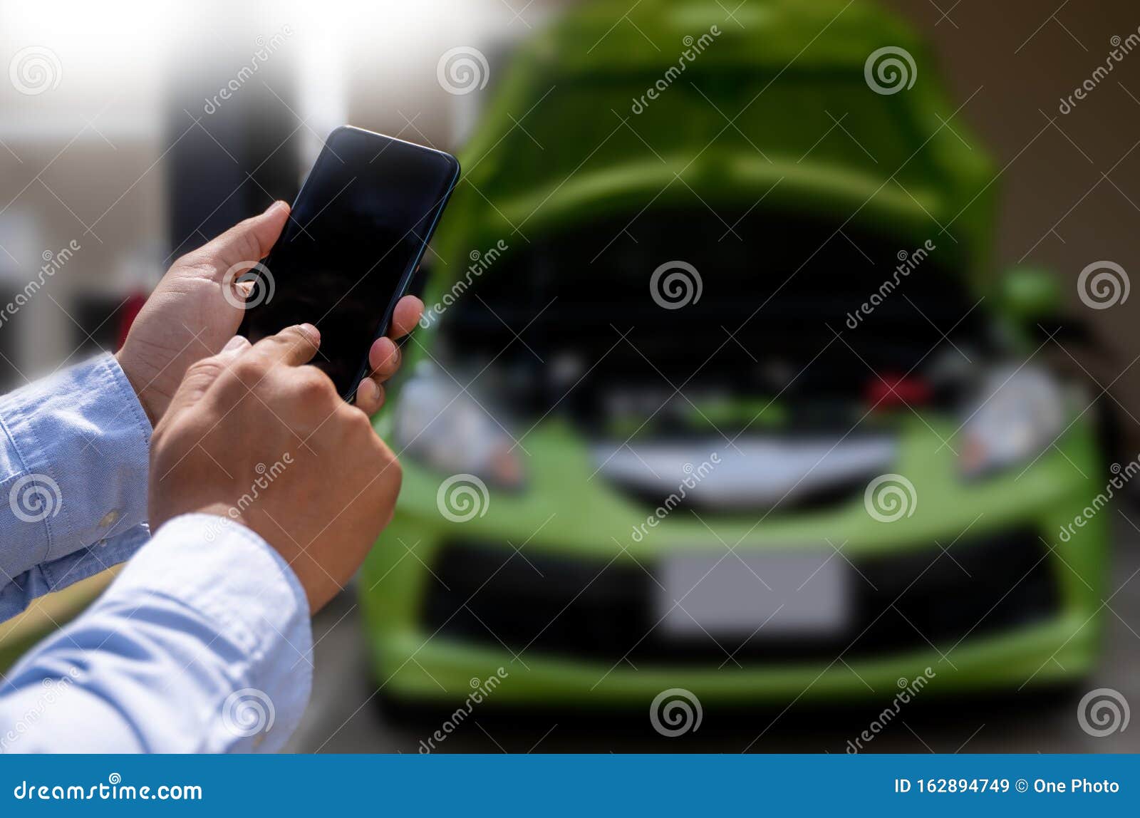 Man Using a Mobile Phone Call To Assistance Help with a Broken Down Car ...