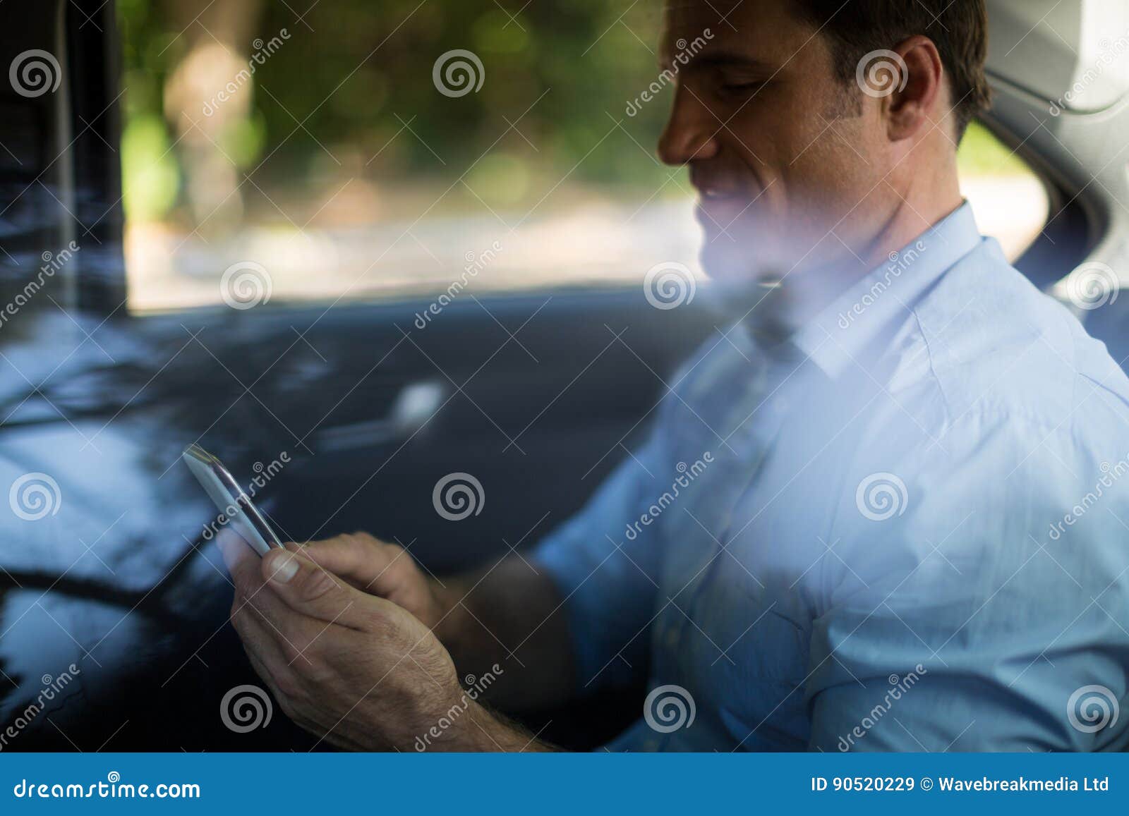 Man Using Mobile Phone in Car Stock Image - Image of adult, mobile ...