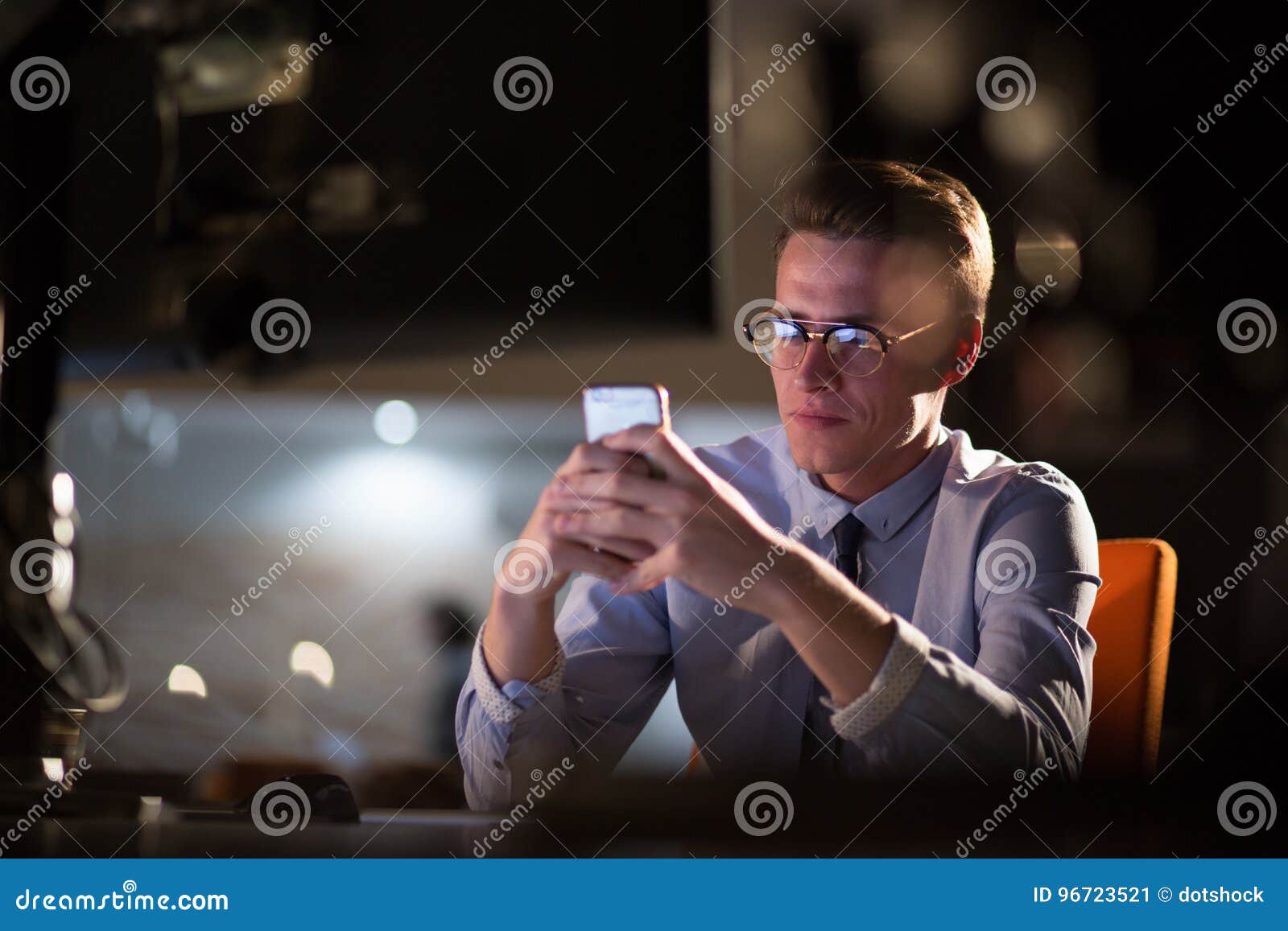 Man Using Mobile Phone in Dark Office Stock Image - Image of design ...