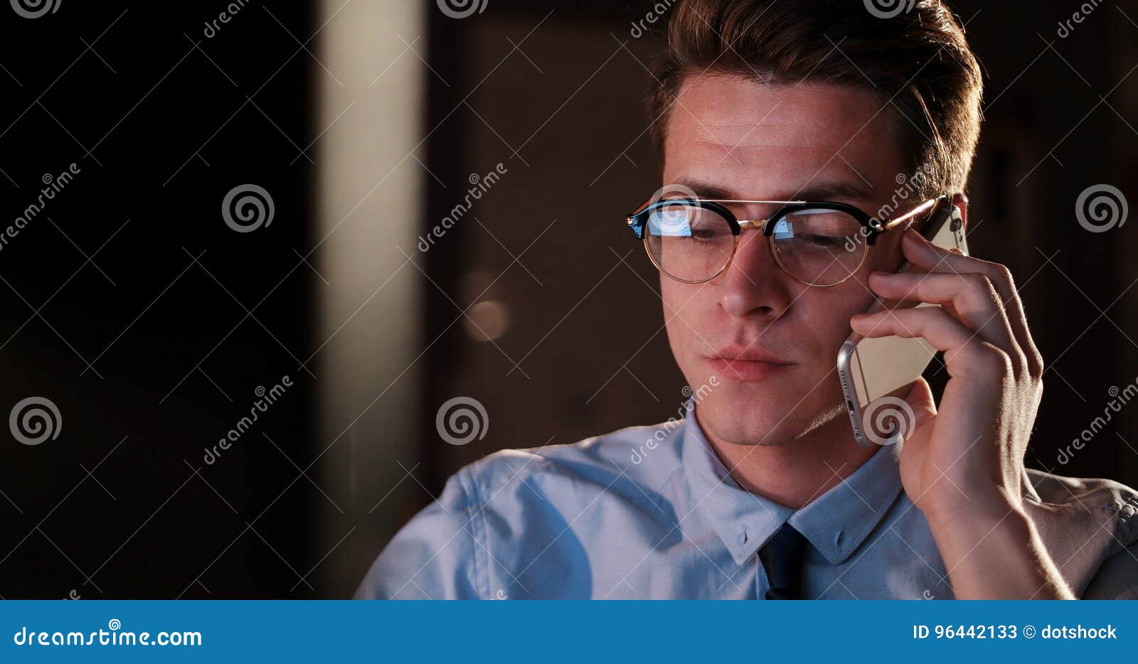 Man Using Mobile Phone in Dark Office Stock Image - Image of ...
