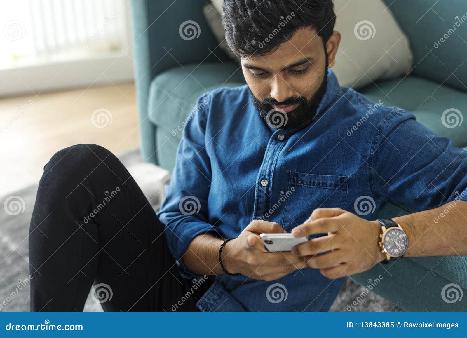 Man Using Mobile Phone on the Floor Stock Image - Image of mobile ...