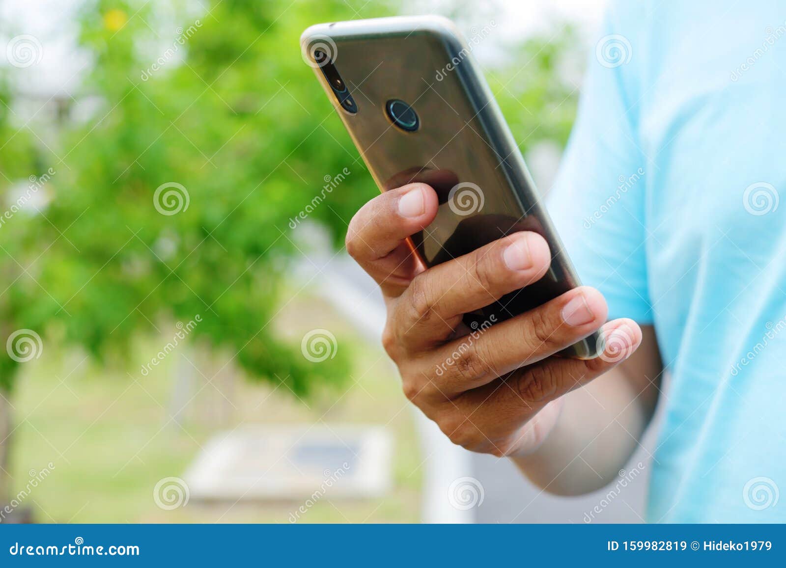 Man is using mobile phone stock image. Image of life - 159982819
