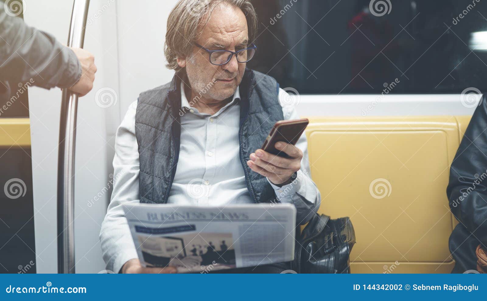 Man Using Mobile Phone in the Metro Train Stock Photo - Image of ...
