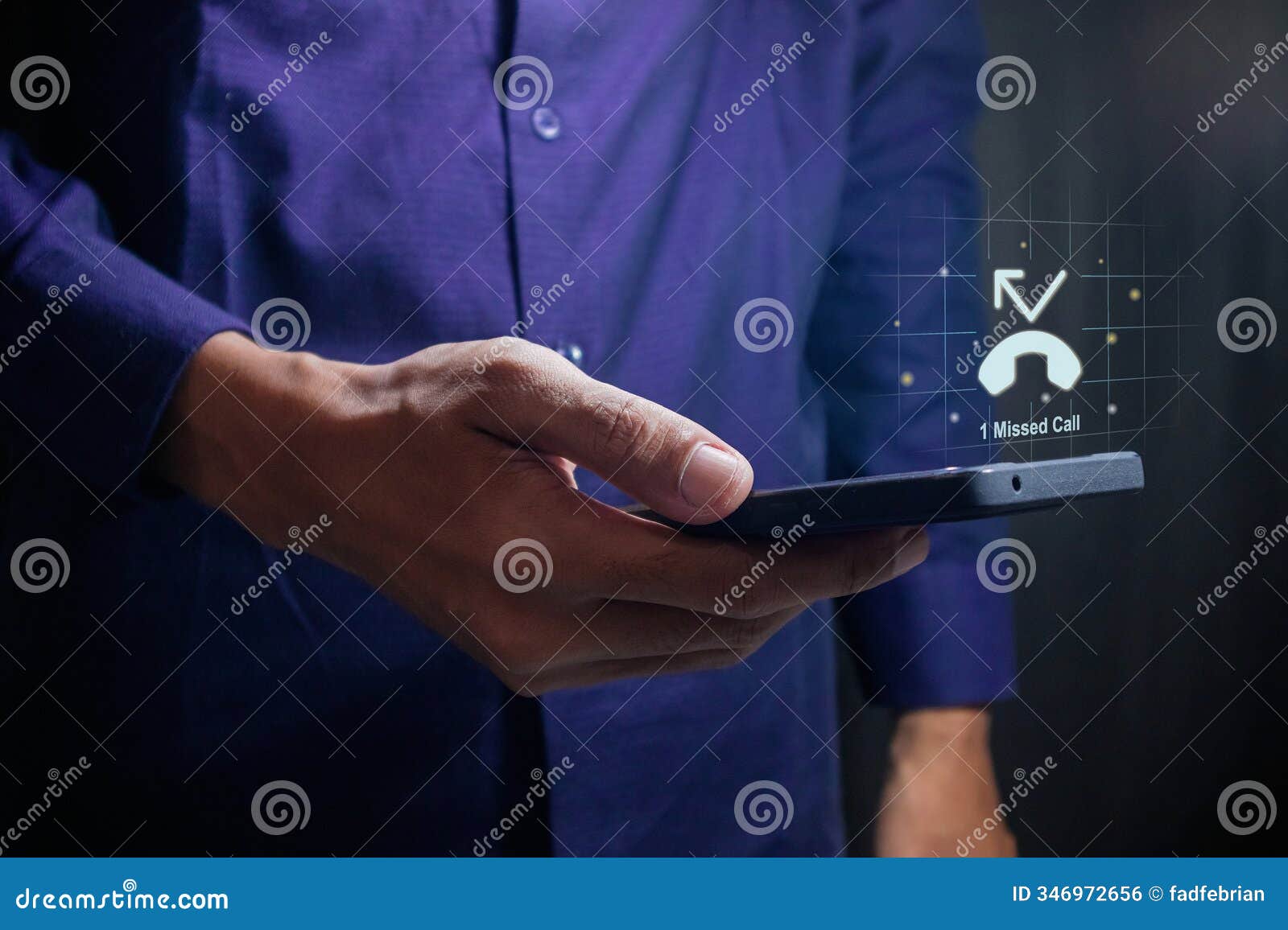 Man Using a Mobile Phone with with Missed Call Notification on the ...
