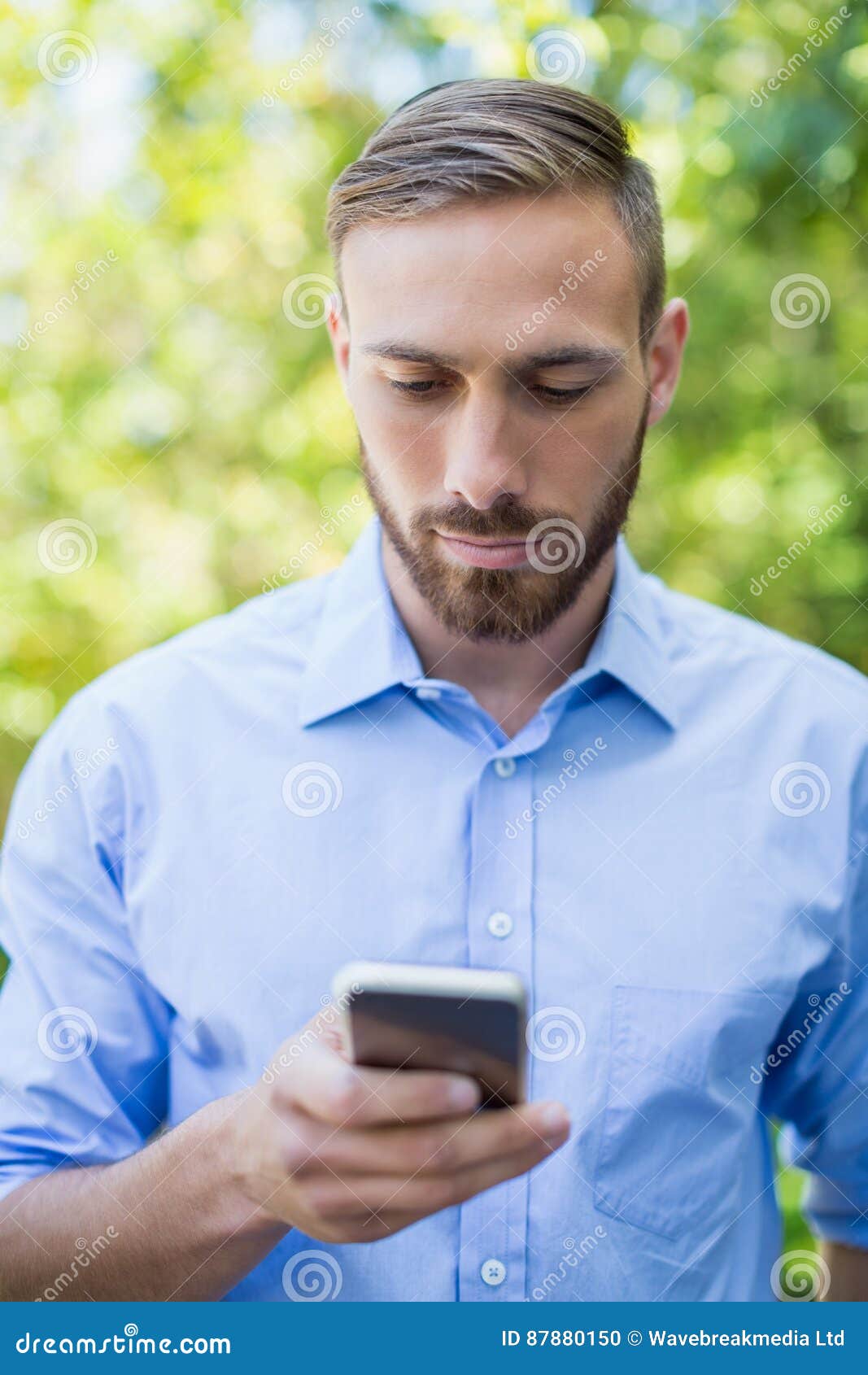 Man using mobile phone stock photo. Image of pretty, internet - 87880150