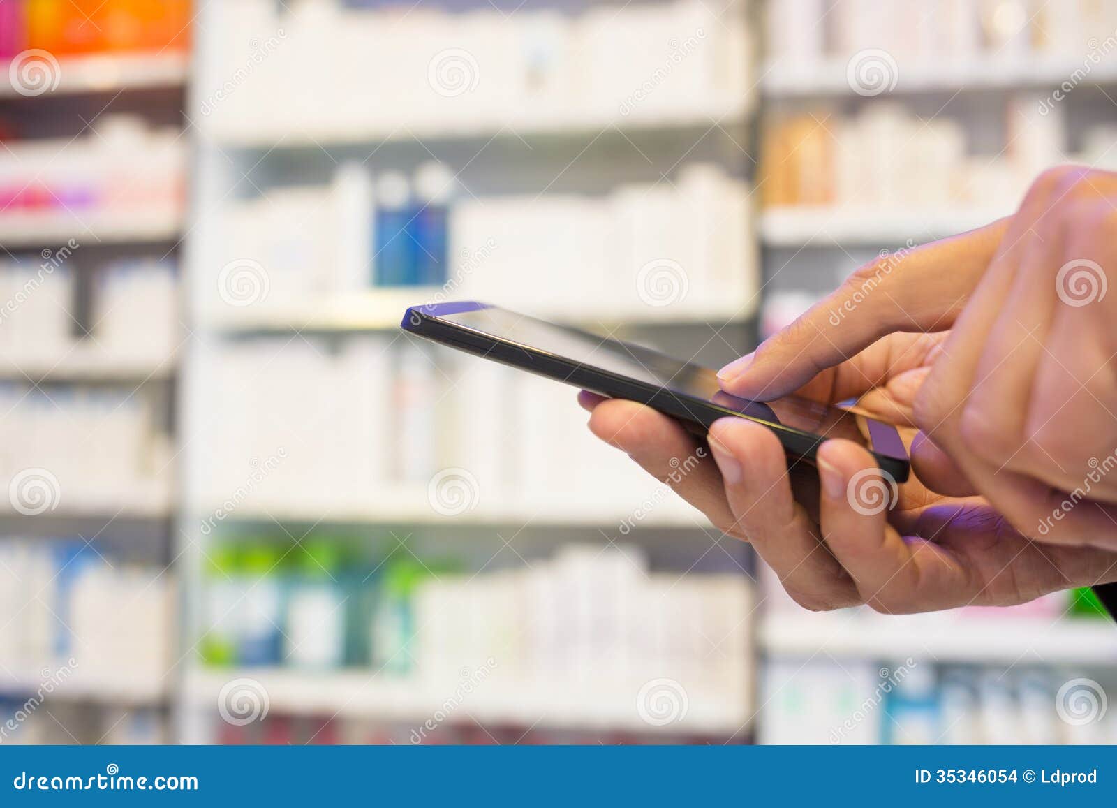 Man Using a Mobile Phone in Pharmacy Stock Photo - Image of cellular ...