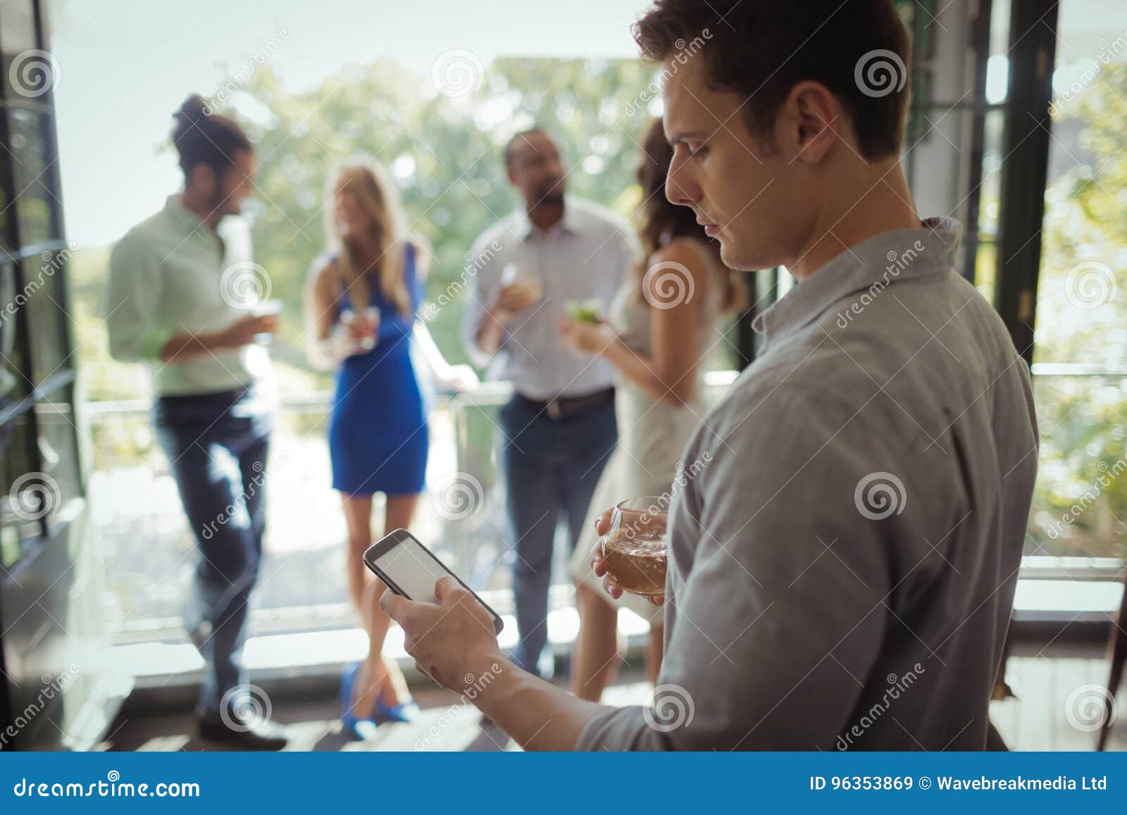 Man Using Mobile Phone in Restaurant Stock Image - Image of cellphone ...