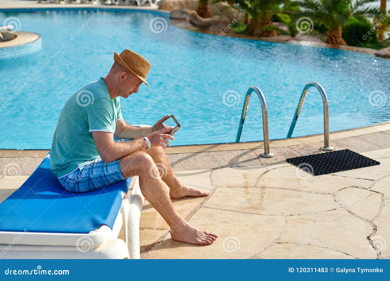 Man Using Mobile Phone on Vacation by the Pool in Hotel, Concept of a ...