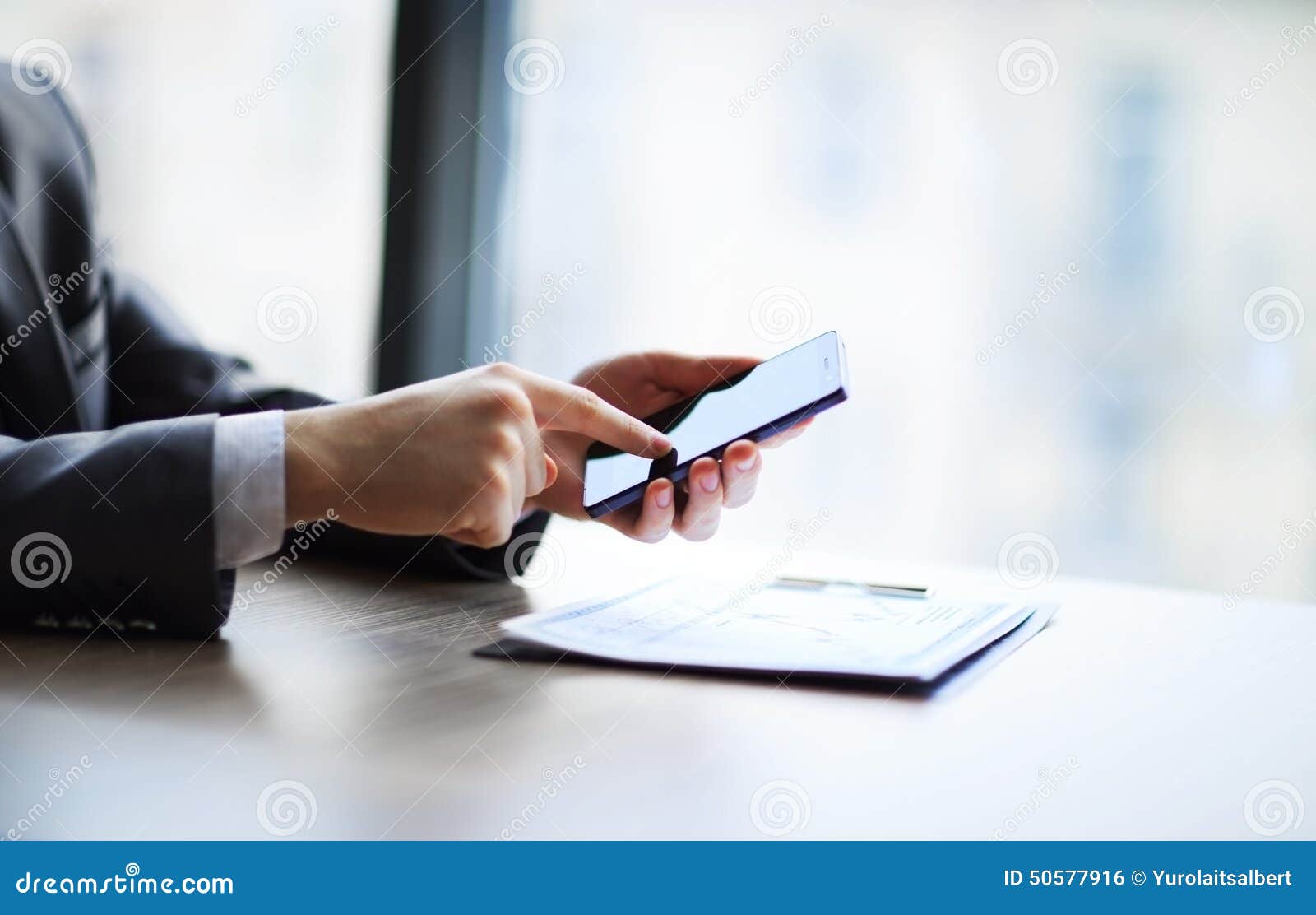 Man Using Mobile Smart Phone in Office Stock Photo - Image of cell ...
