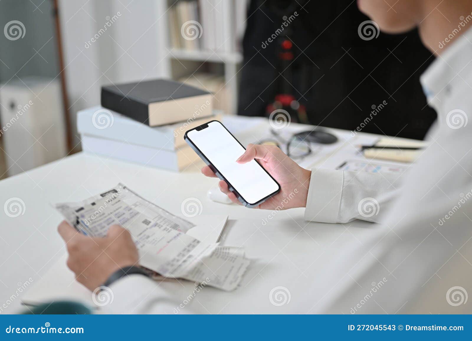 Man Using Mobile Smart Phone for Paying Electricity Bills at Desk ...