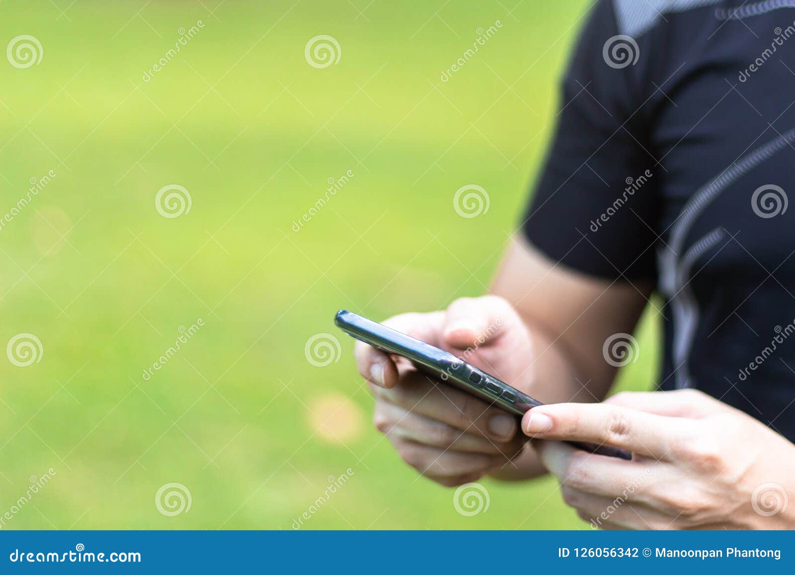 Man Using Mobile Smartphone in Park Stock Photo - Image of manage ...