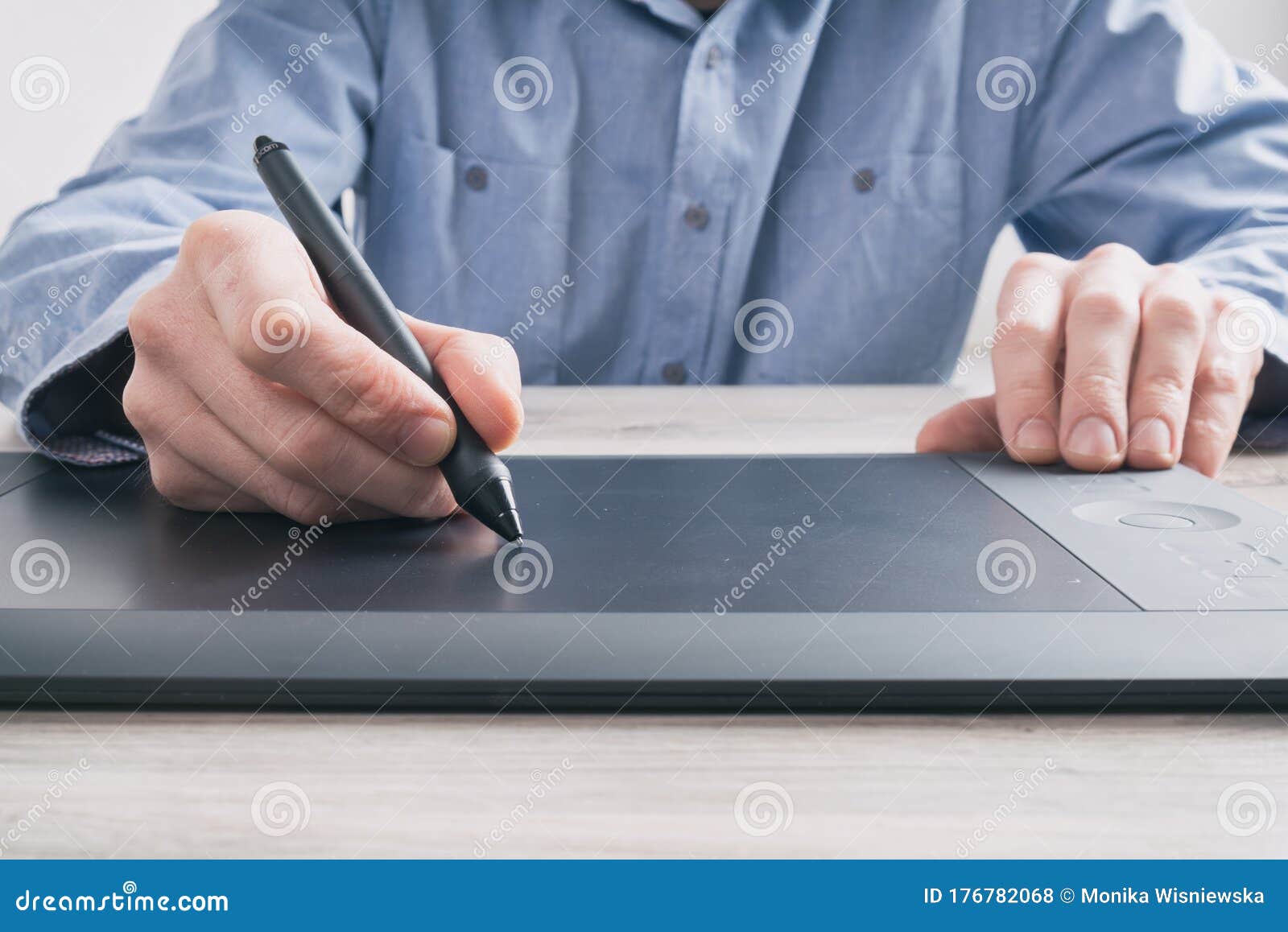 Man using graphical tablet stock photo. Image of illustrator - 176782068