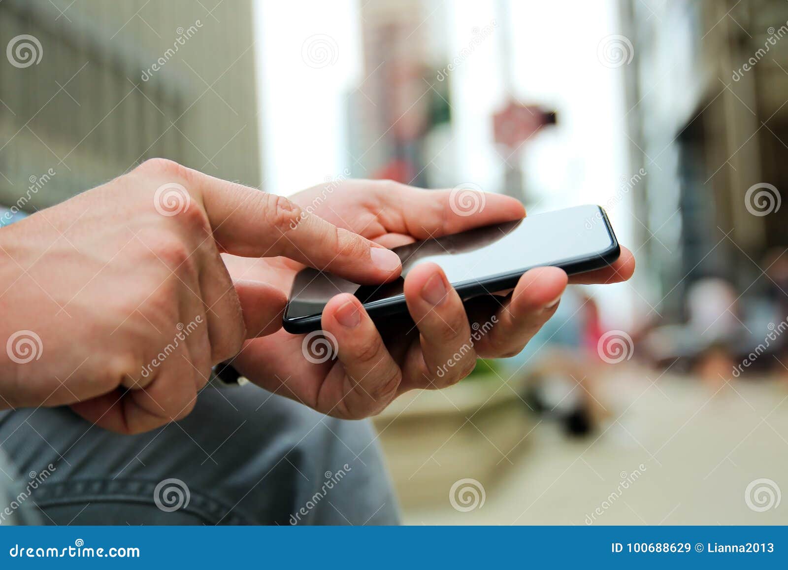 Man Using a Modern Mobile Phone Outside Stock Image - Image of ...