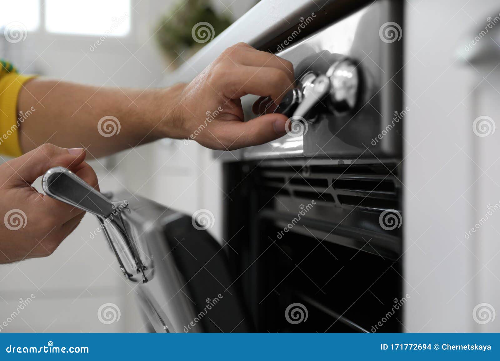 Man Using Modern Oven in Kitchen Stock Photo - Image of cook ...