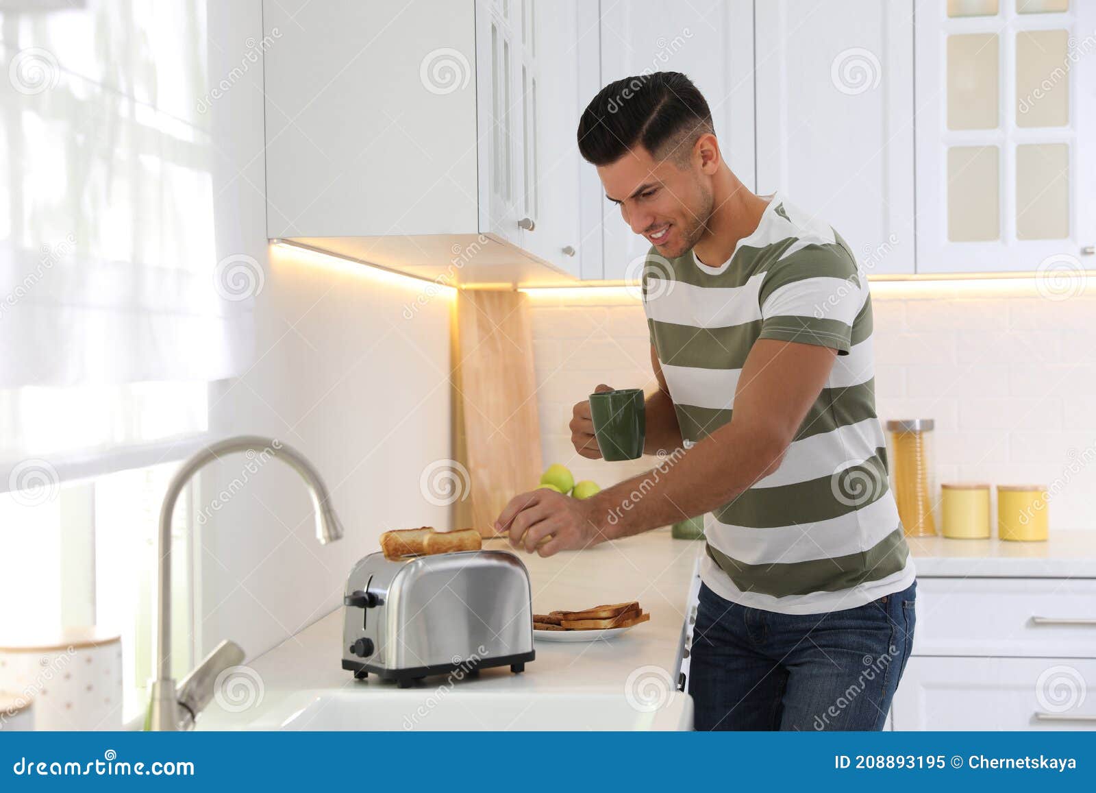Man Using Modern Toaster at Kitchen Counter Stock Image - Image of ...